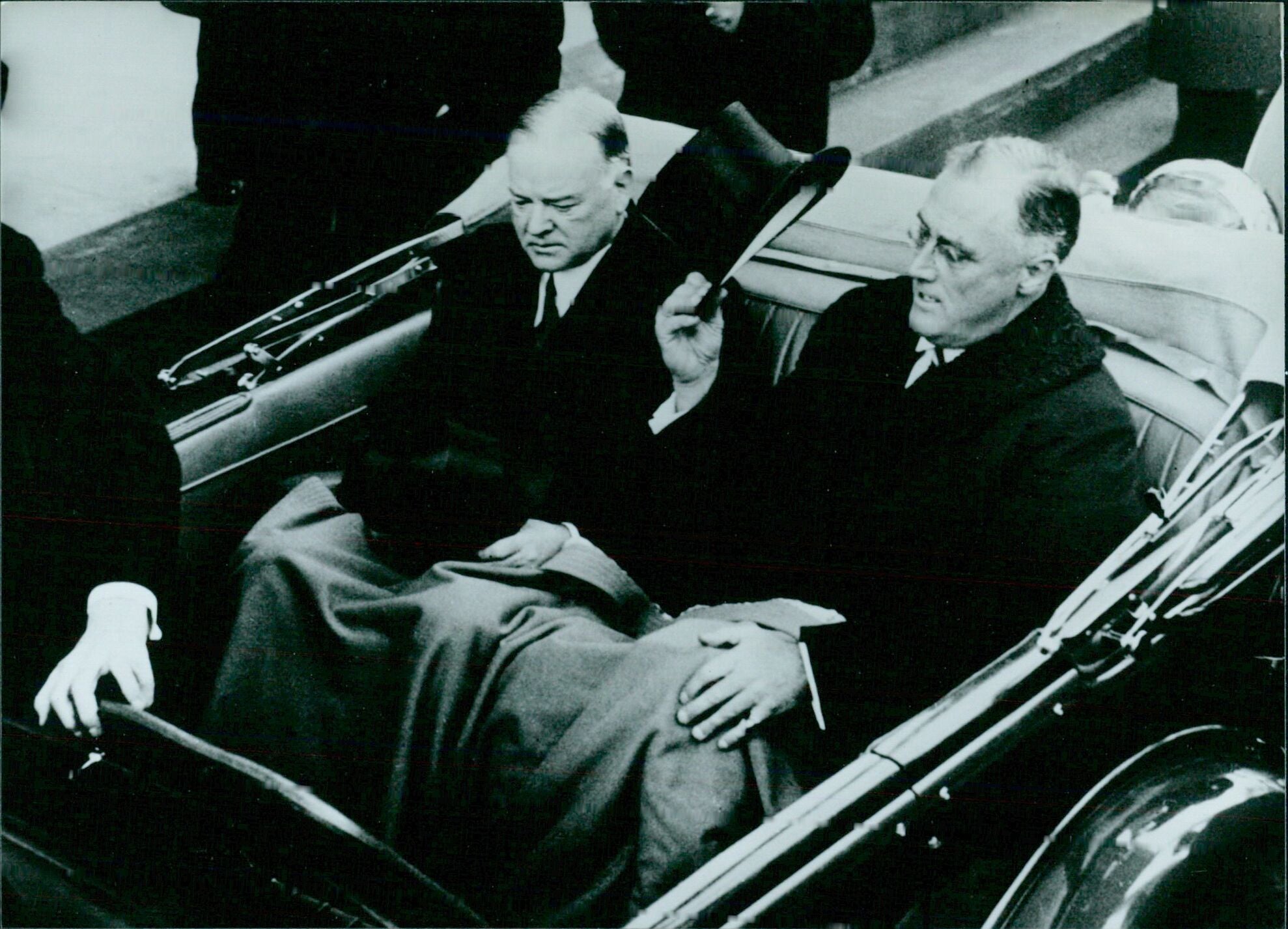 President Franklin Delano Roosevelt and Herbert Hoover take a ride in