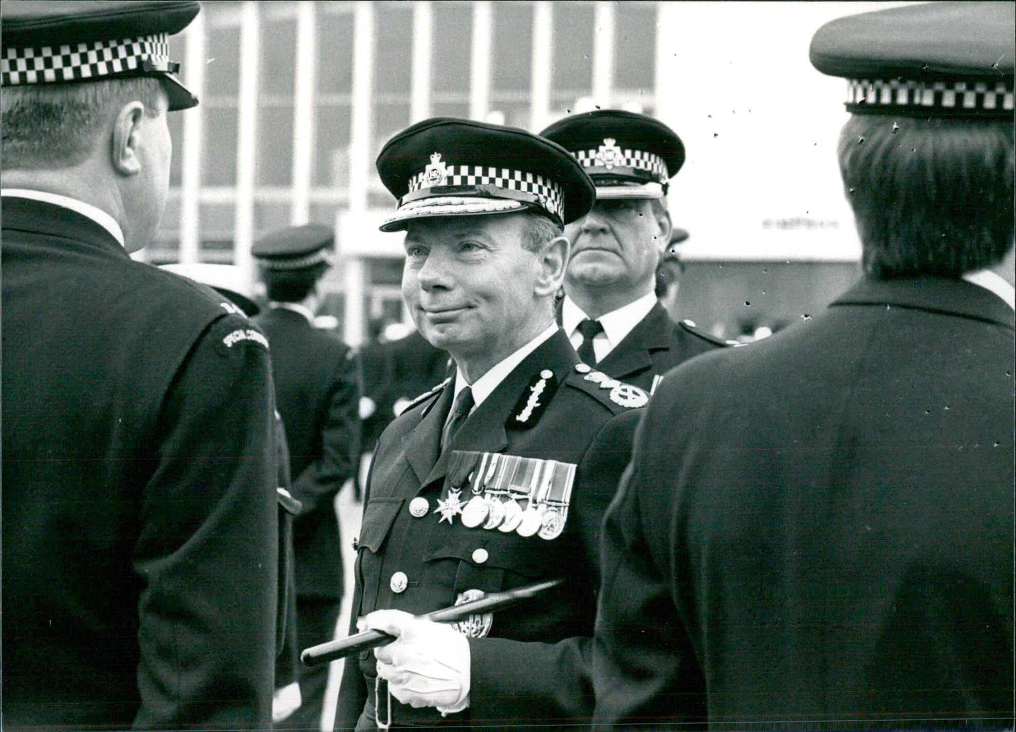 Sir Kenneth Neuman inspecting a parade at Police Cadet headquarters