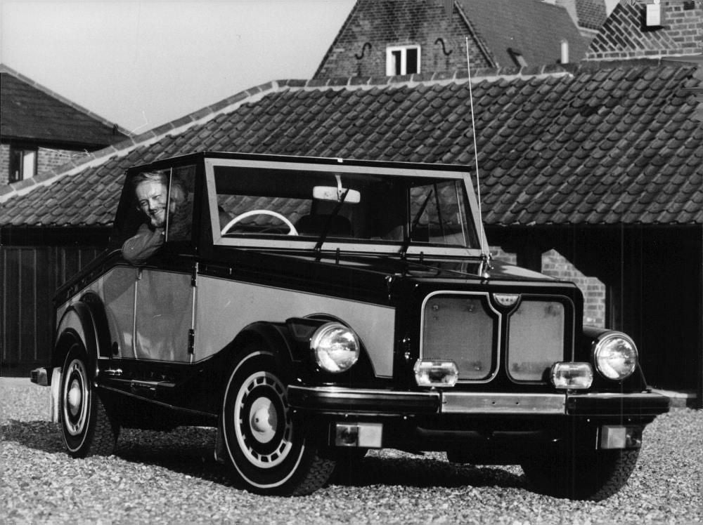 Derek howes in his home built two door touring sedan. - Vintage Photog
