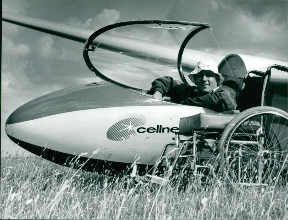 Gary Bennett leaves his wheelchair behind as he prepares for take-off