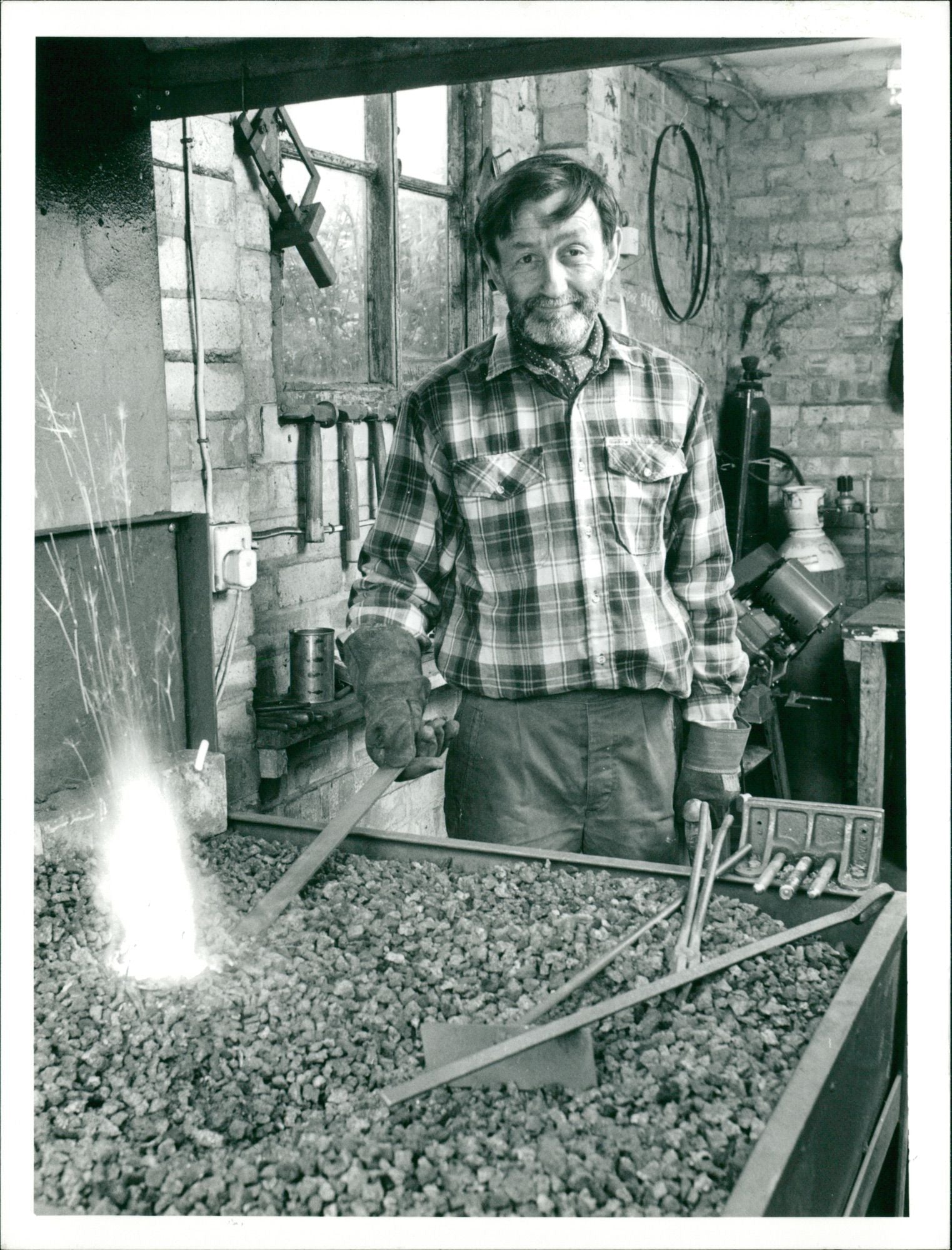 Blacksmith tony fox carter pictured at his forge. - Vintage Photograph