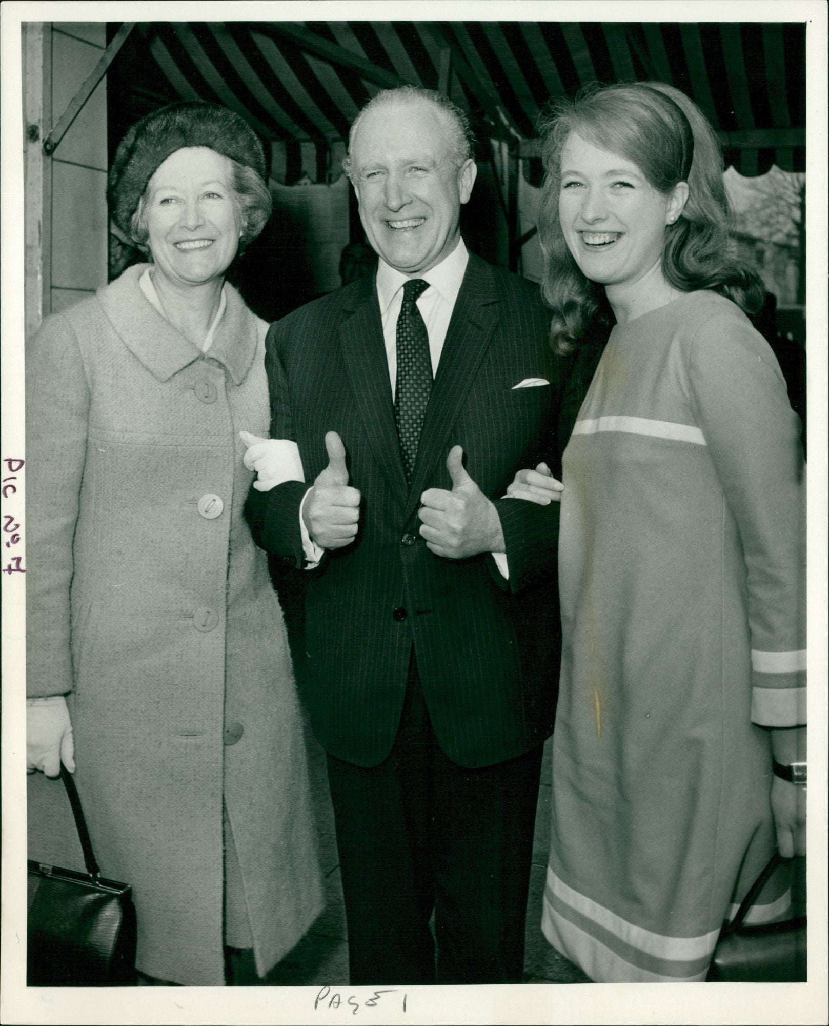 Sally Plummer with her parents Mr. and Mrs. Desmond Plummer. - Vintage