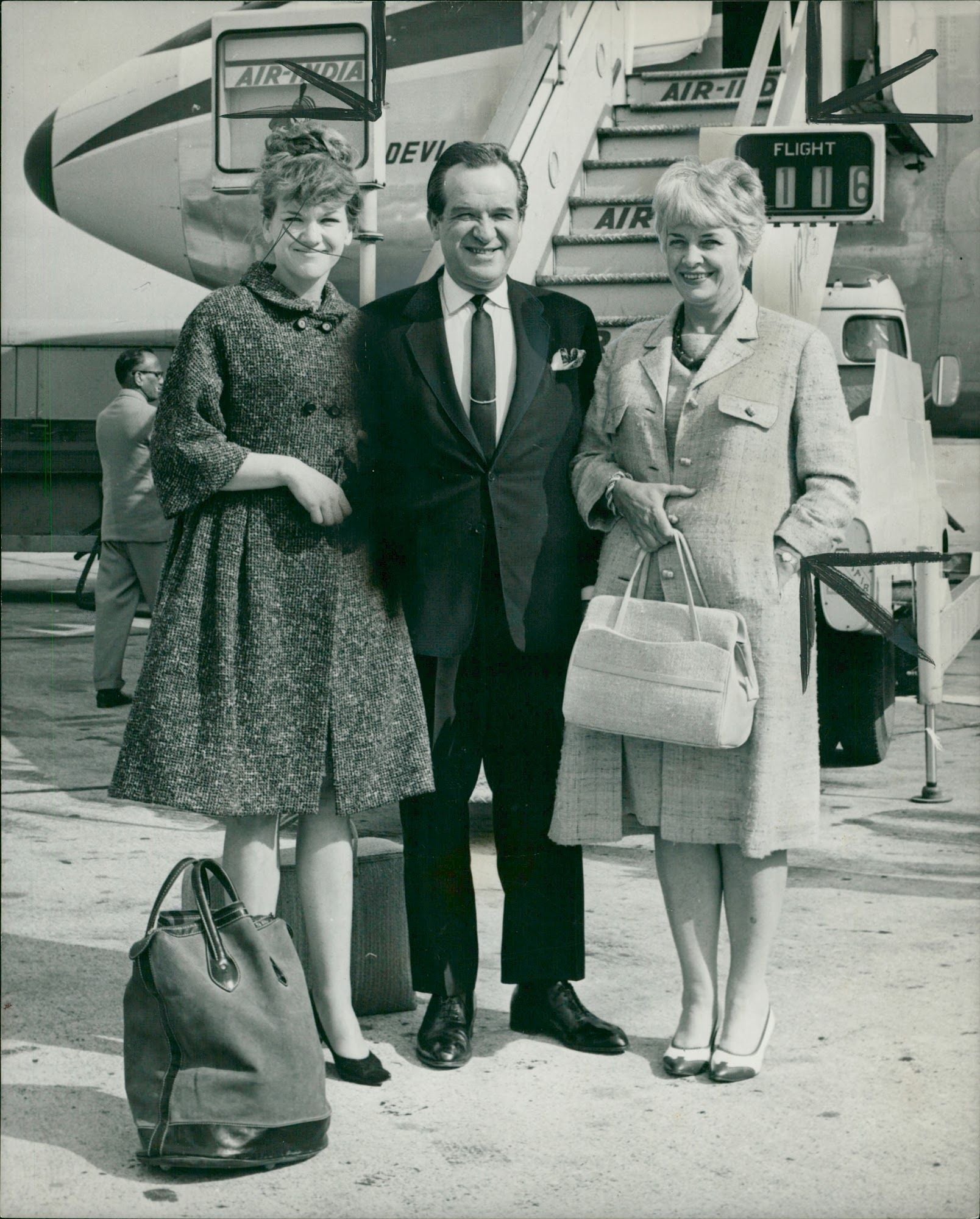 Mr. Al Capp with wife and their daughter: Mr. Al Capp, creator of the