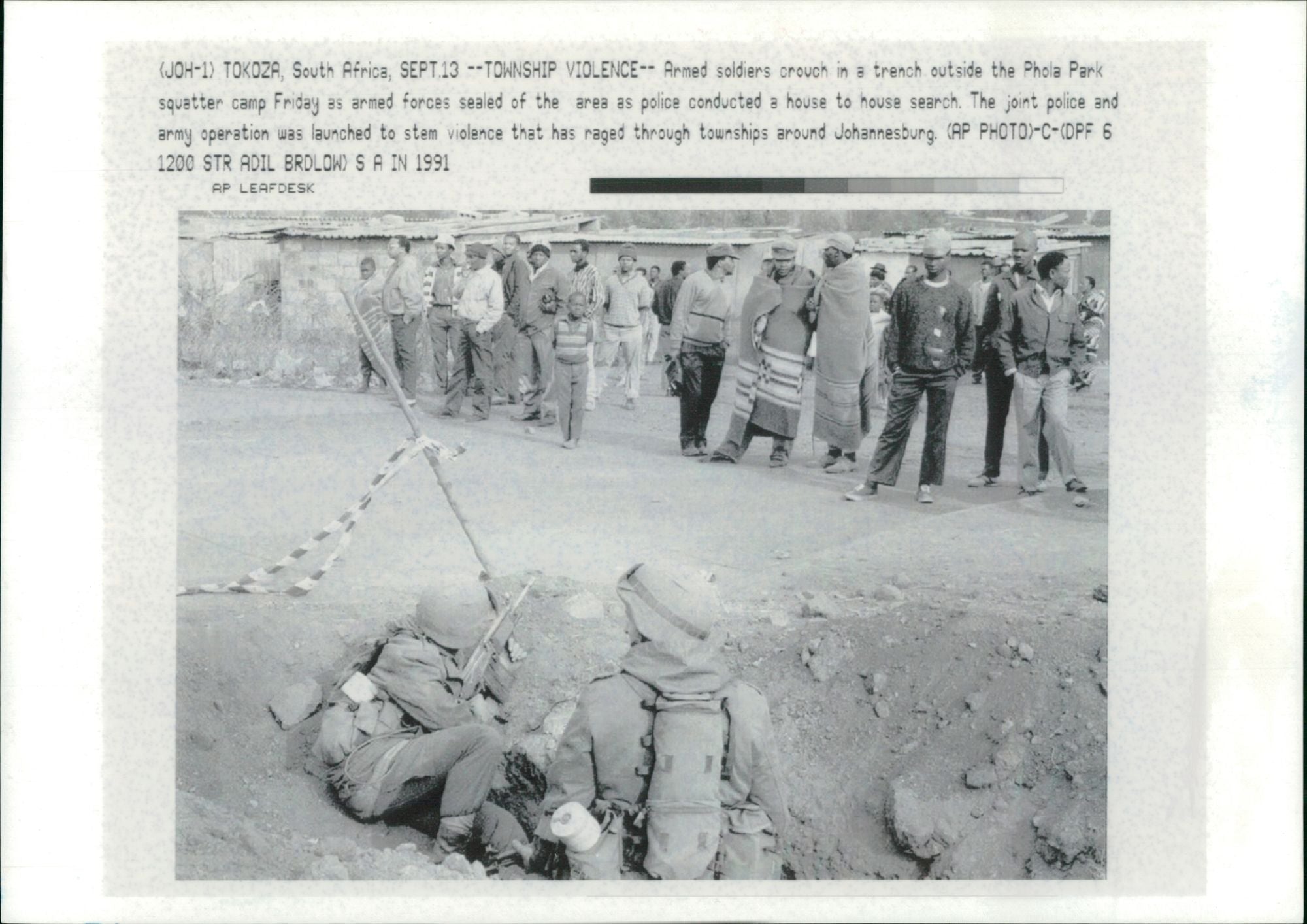 Armed soldiers crouch. - Vintage Photograph