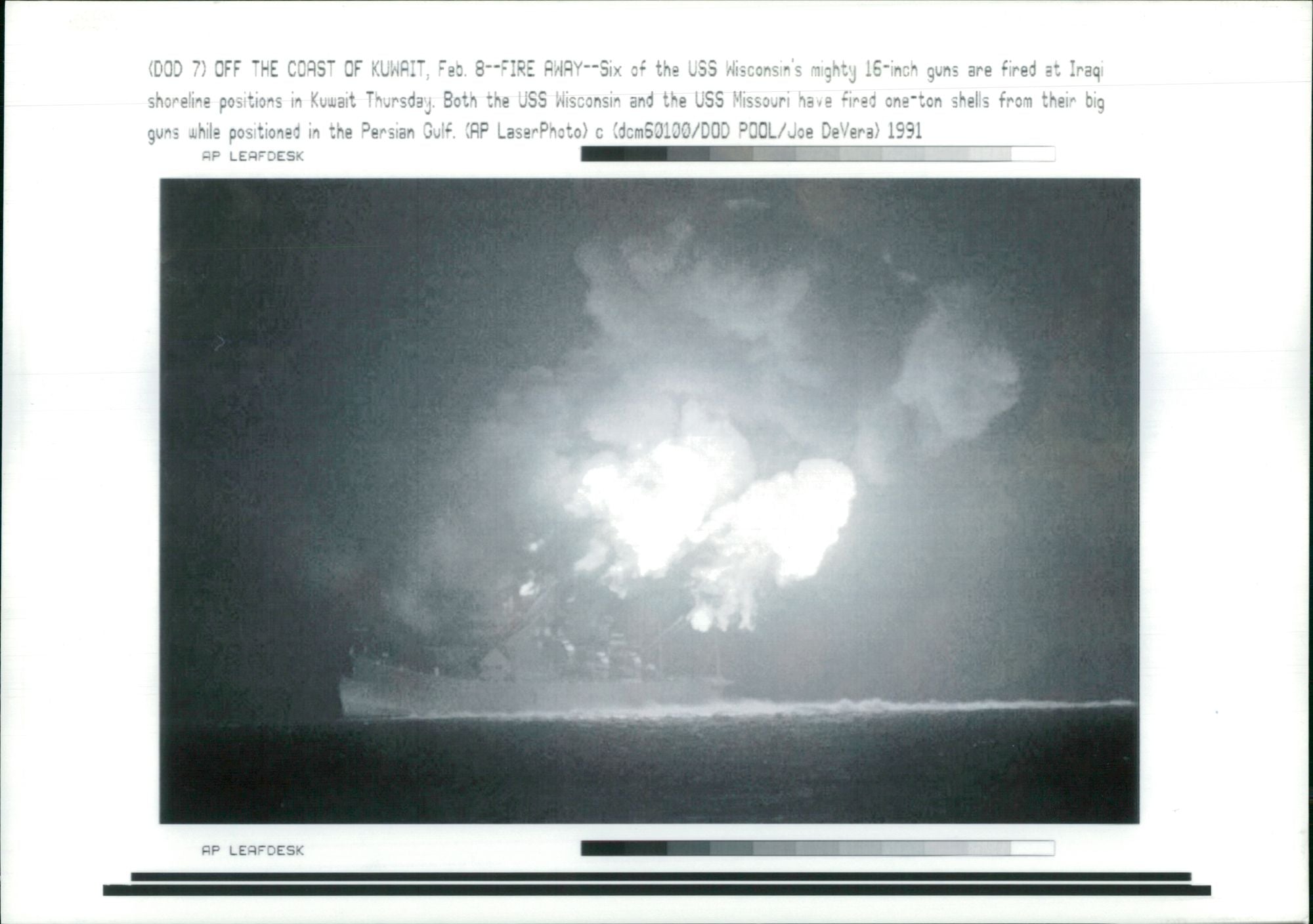 Six of the USS Wisconsin's mighty 16-inch guns are fired at Iraqi. - V