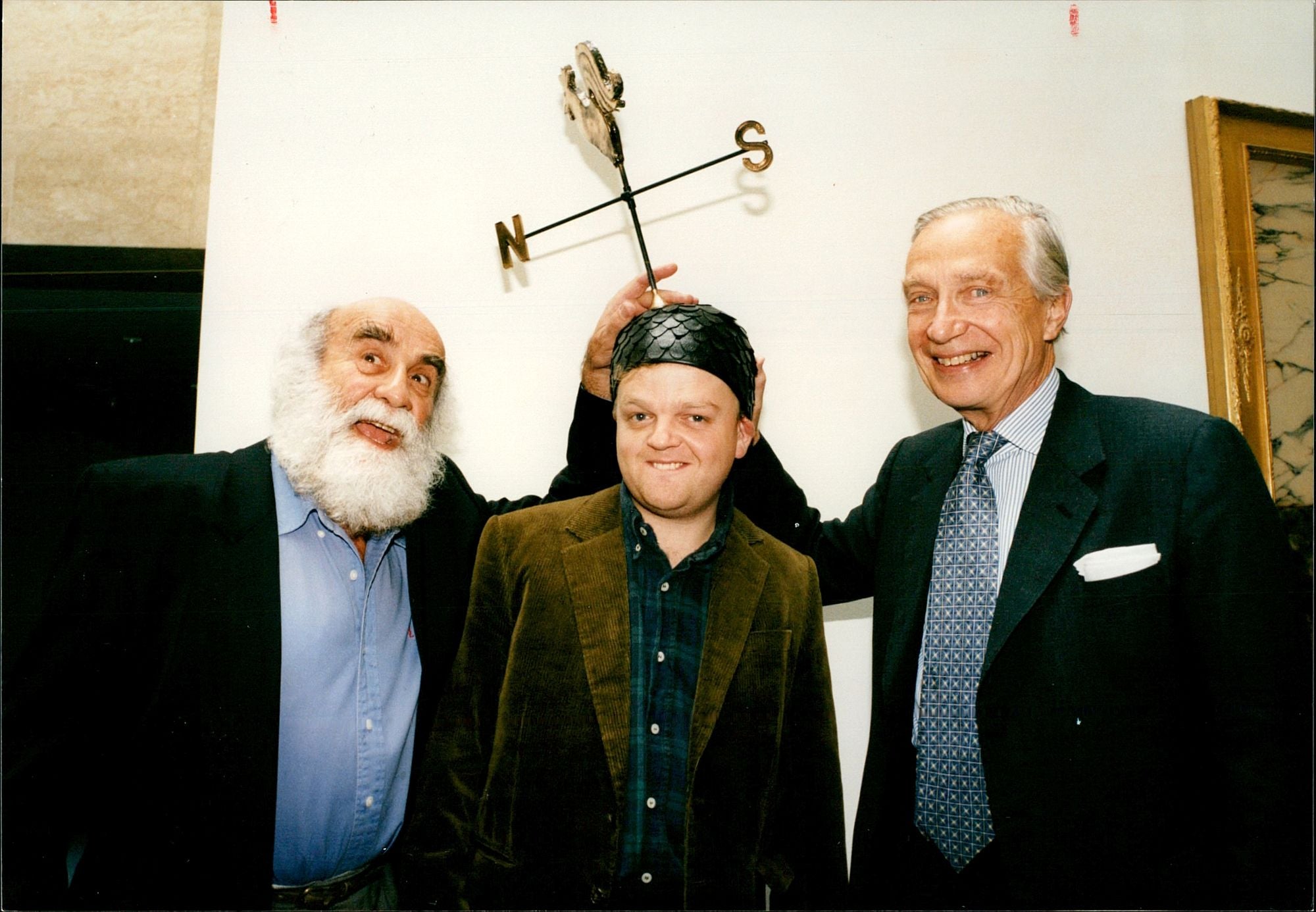 Actor Warren Mitchell (L) with Toby Jones and Sir Martin Jacomb (R)