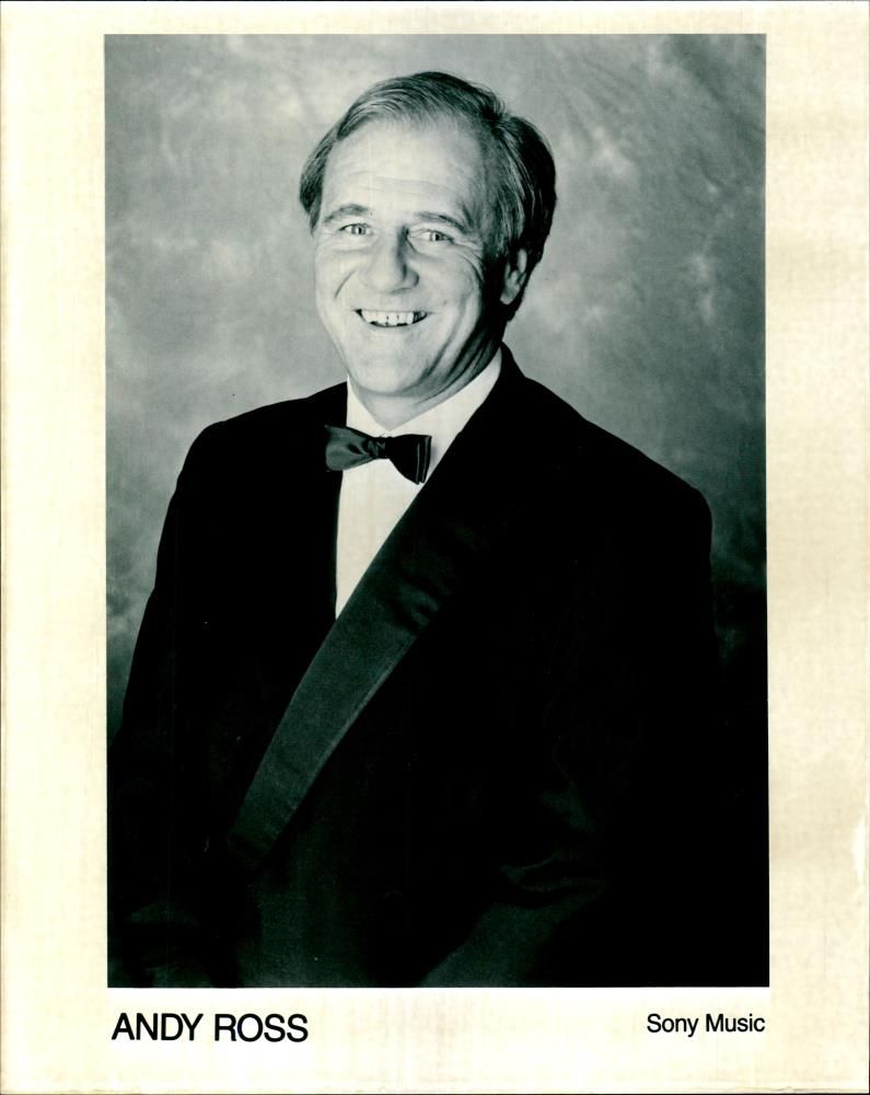 A photo of a conductor known as Andy Ross. - Vintage Photograph