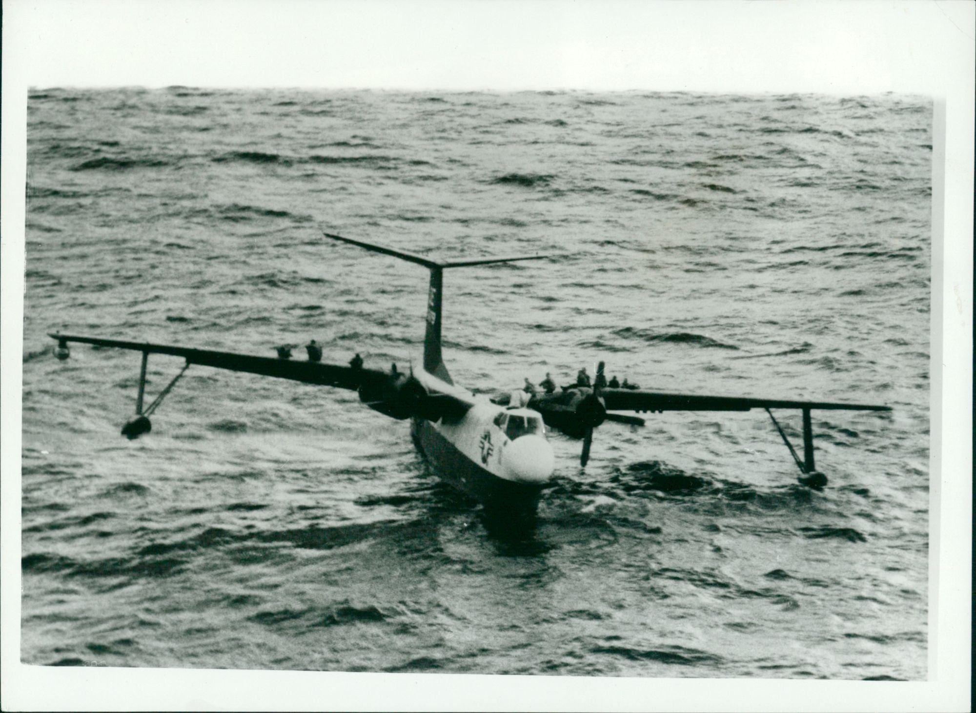 KEYSTONE THEIR AFTER WHICH FLYING WINGS RESOUE SIT NAVY MEMBERS AIRCRA