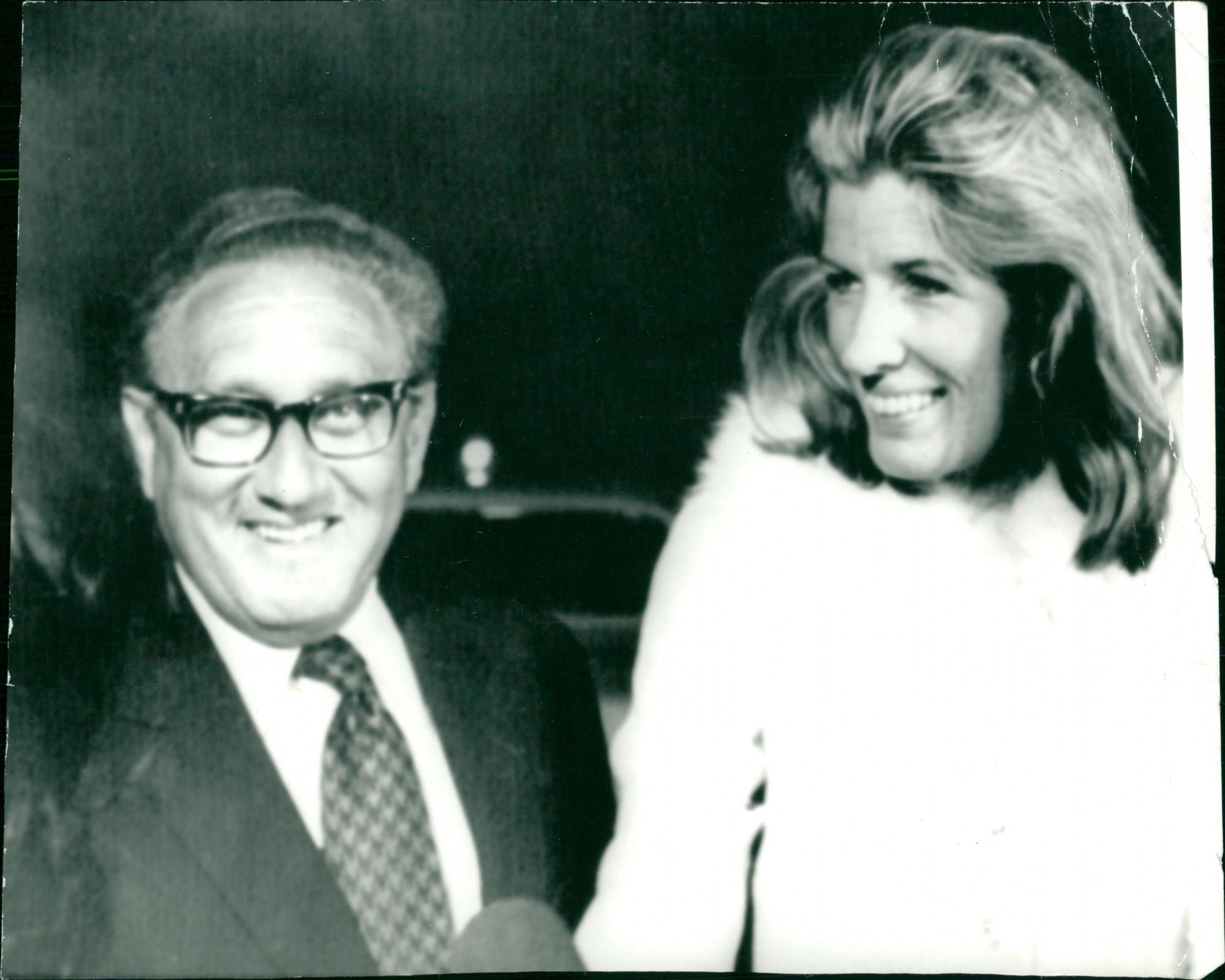 Henry Kissinger and his wife Nancy. - Vintage Photograph