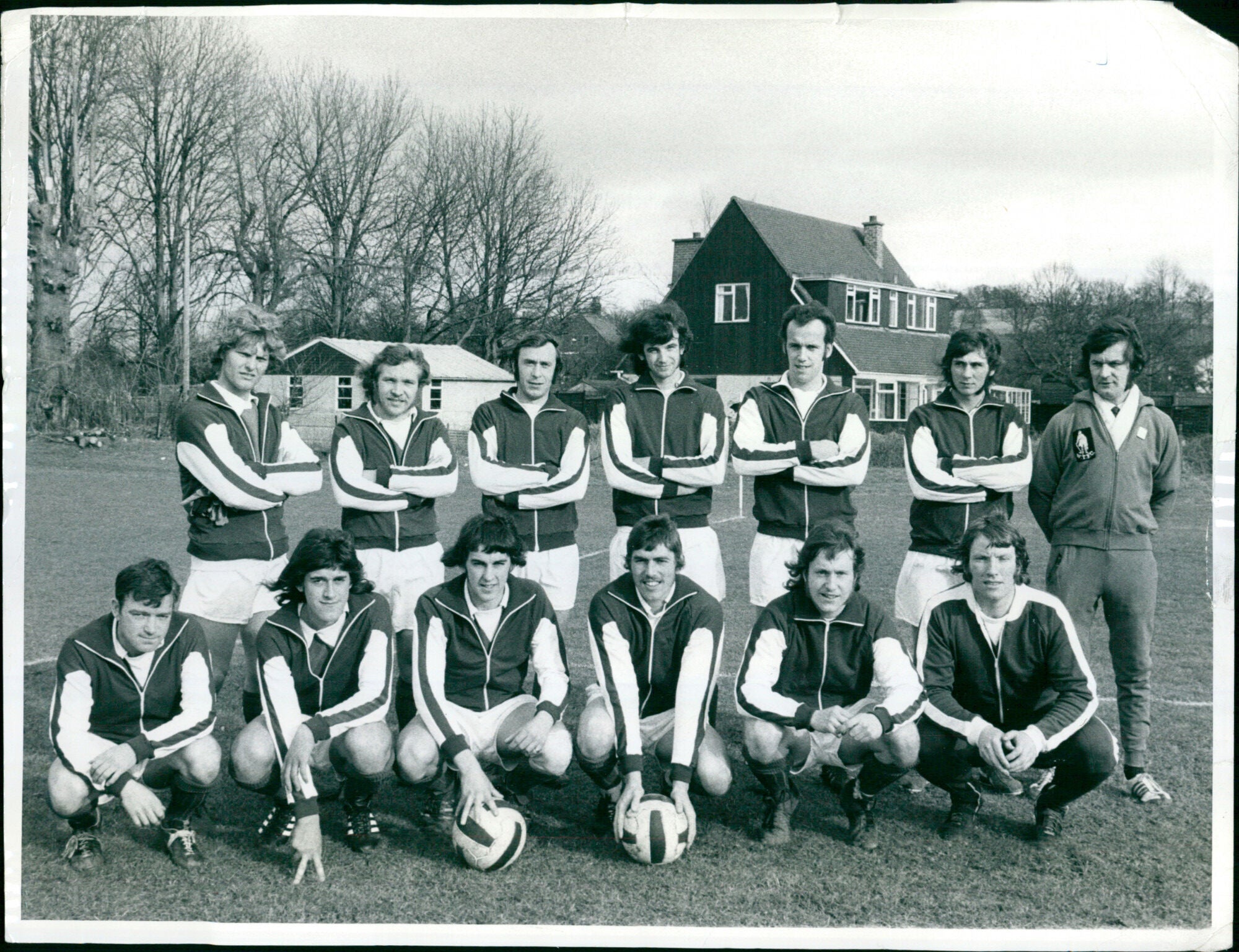 Members of the Wantage In F.C. football team pose for a photograph.
