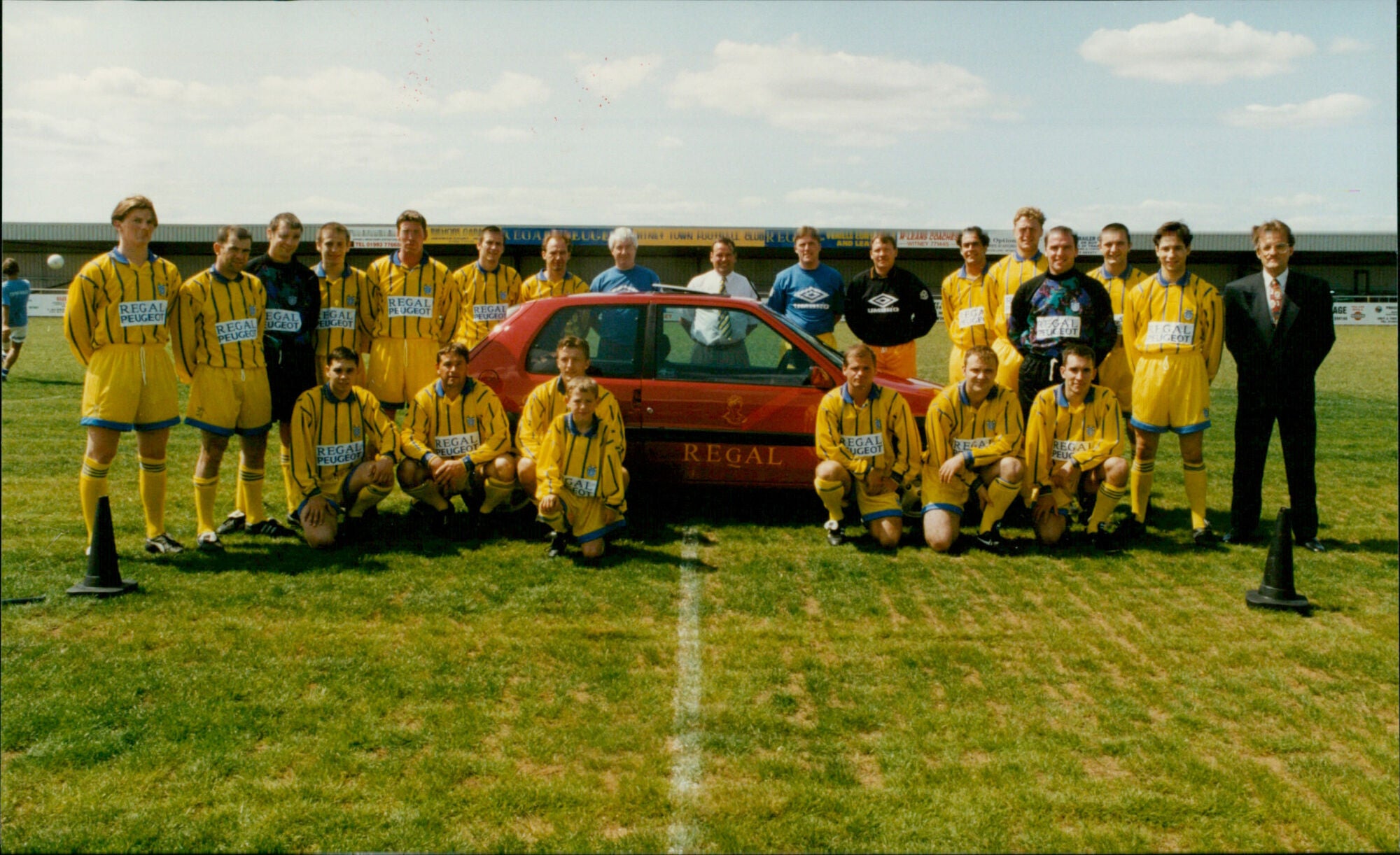 Members of Witney Town Football Team pose for a photograph before thei