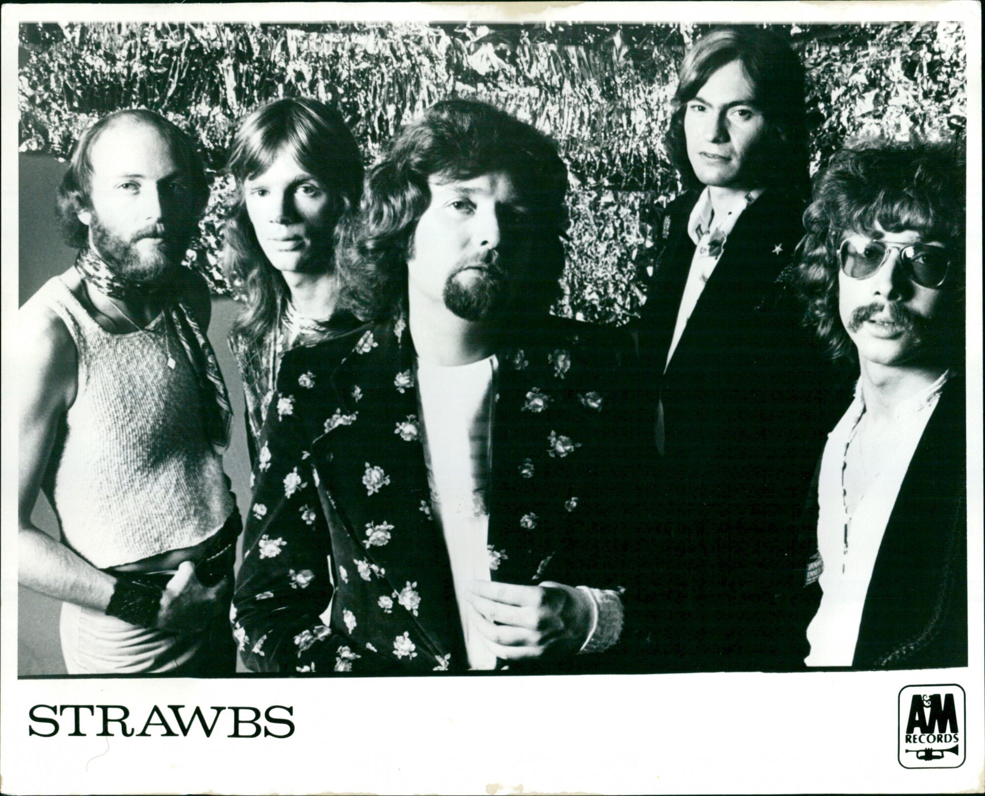 Legendary band The Strawbs pose with their new record, - Vintage Photo