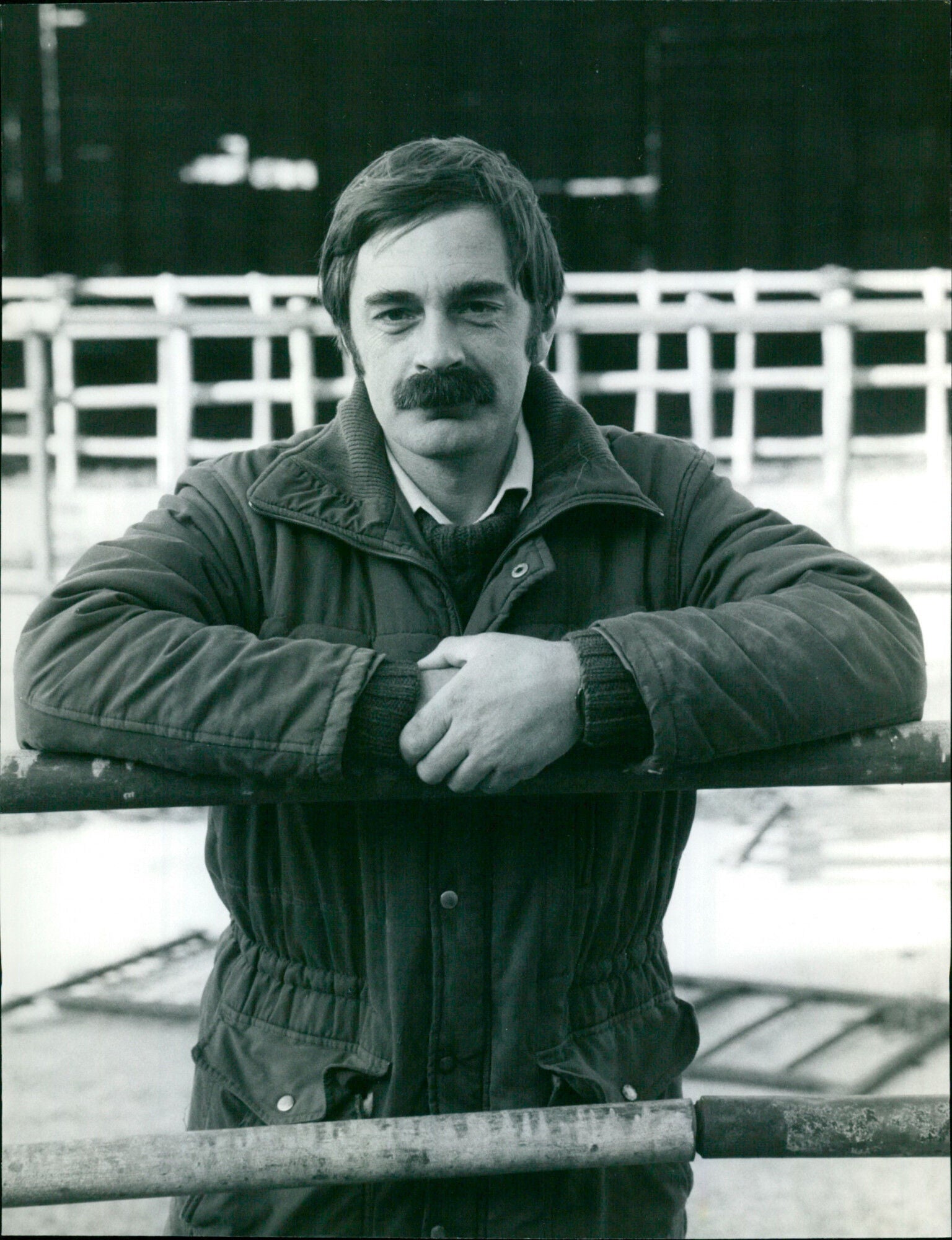 Manager Jim Young of Warren Farm Horton-C Studiey inspects a crop. - V