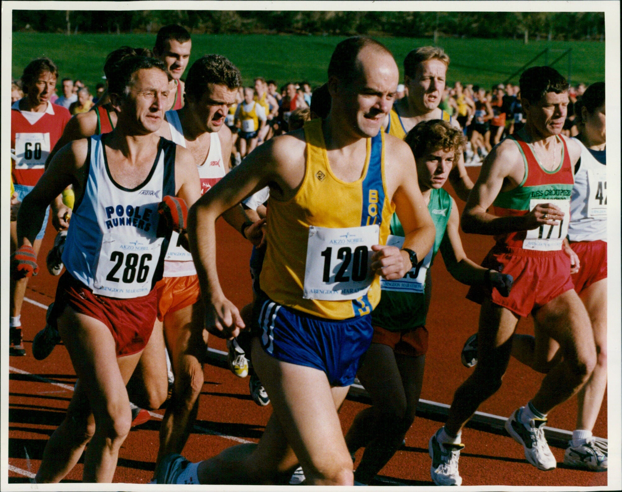 John Cox, Ronnie James and Lisa Godding-Feltham cross the finish line
