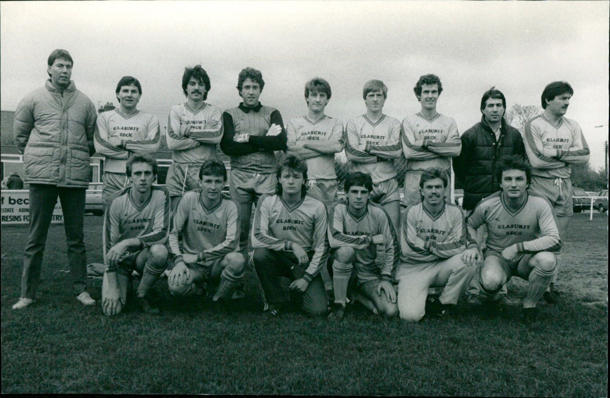 Members of the 1984 Frond Row team pose for a group photograph after t