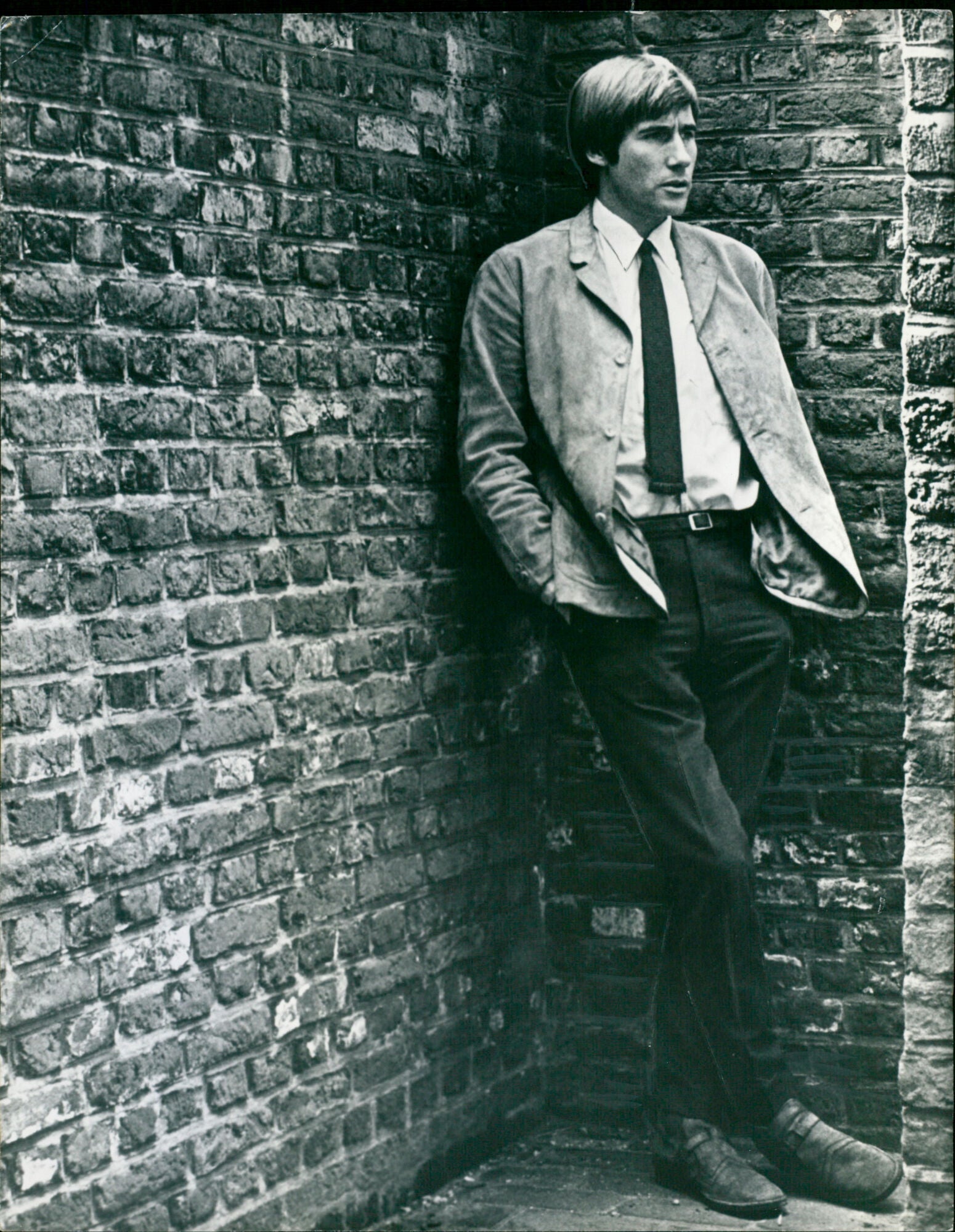 Actor Jim Dale poses for a portrait in July 1969. - Vintage Photograph