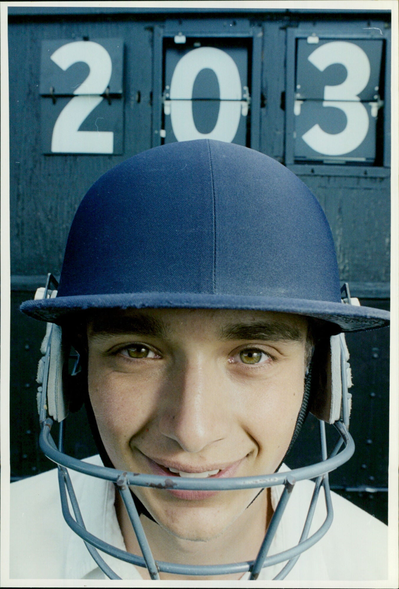 Cricket player James Cook celebrates a record-breaking performance at