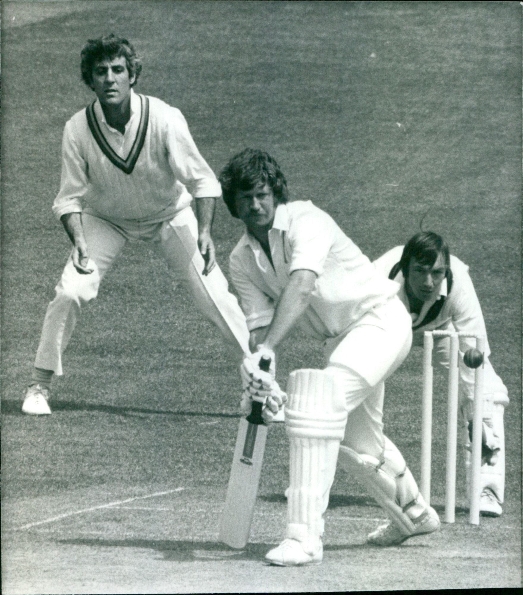 Gary Cosier of the Australian cricket party celebrates a century in hi