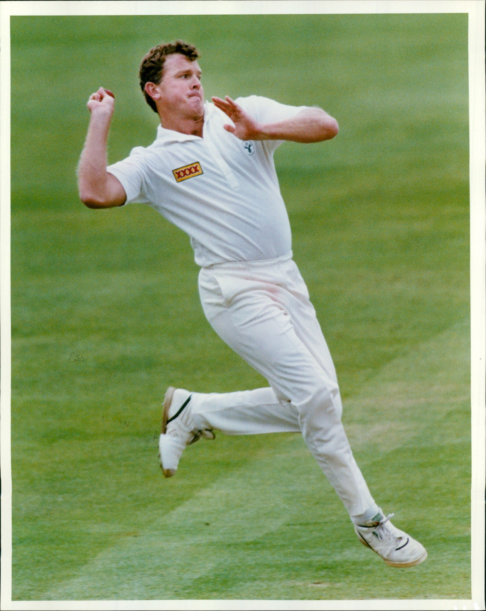Australian cricketer Craig McDermott in action during a 1993 match.