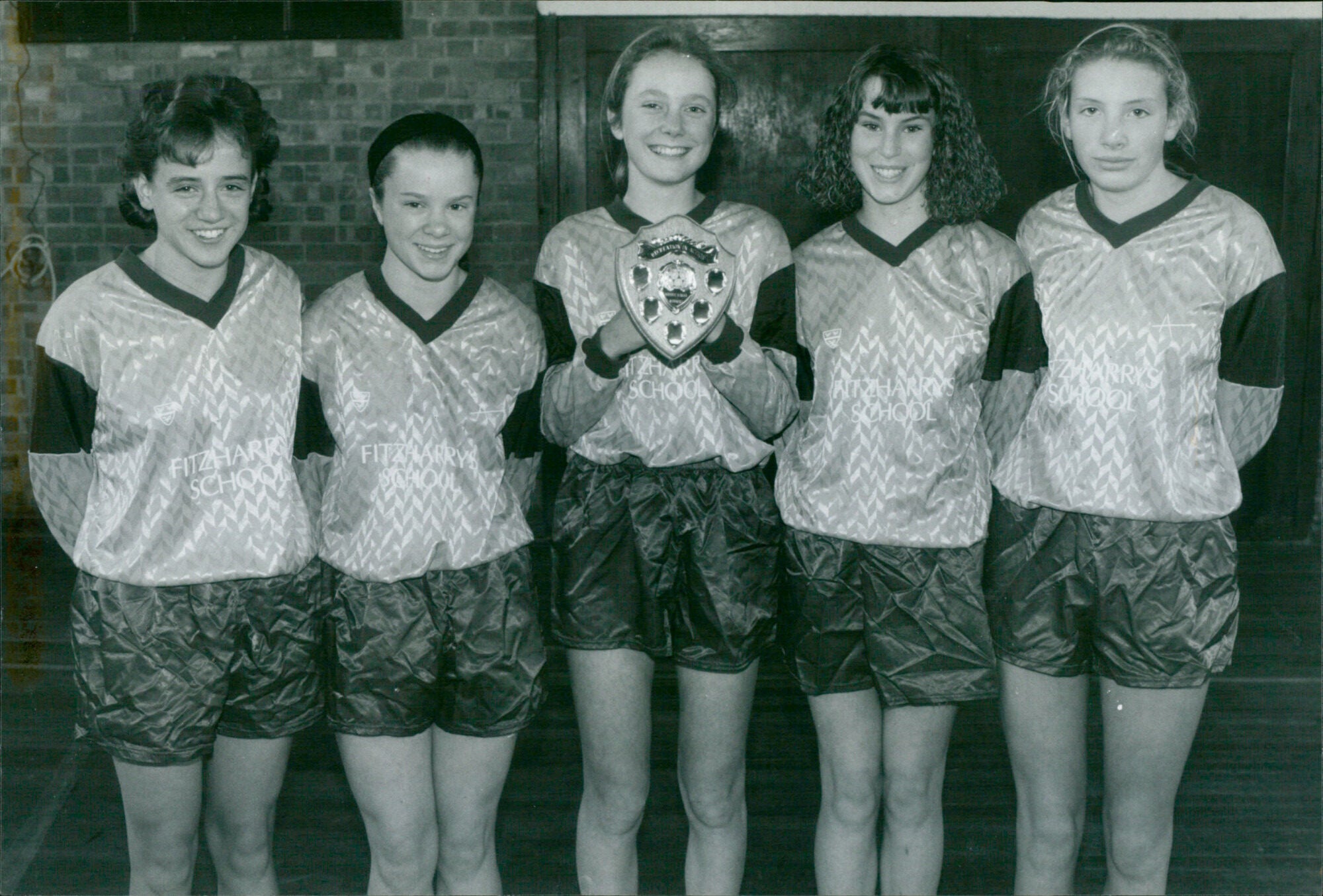 Five girls from Fitzhar D Fitzharrys Girls 5-A-Side Team pose together