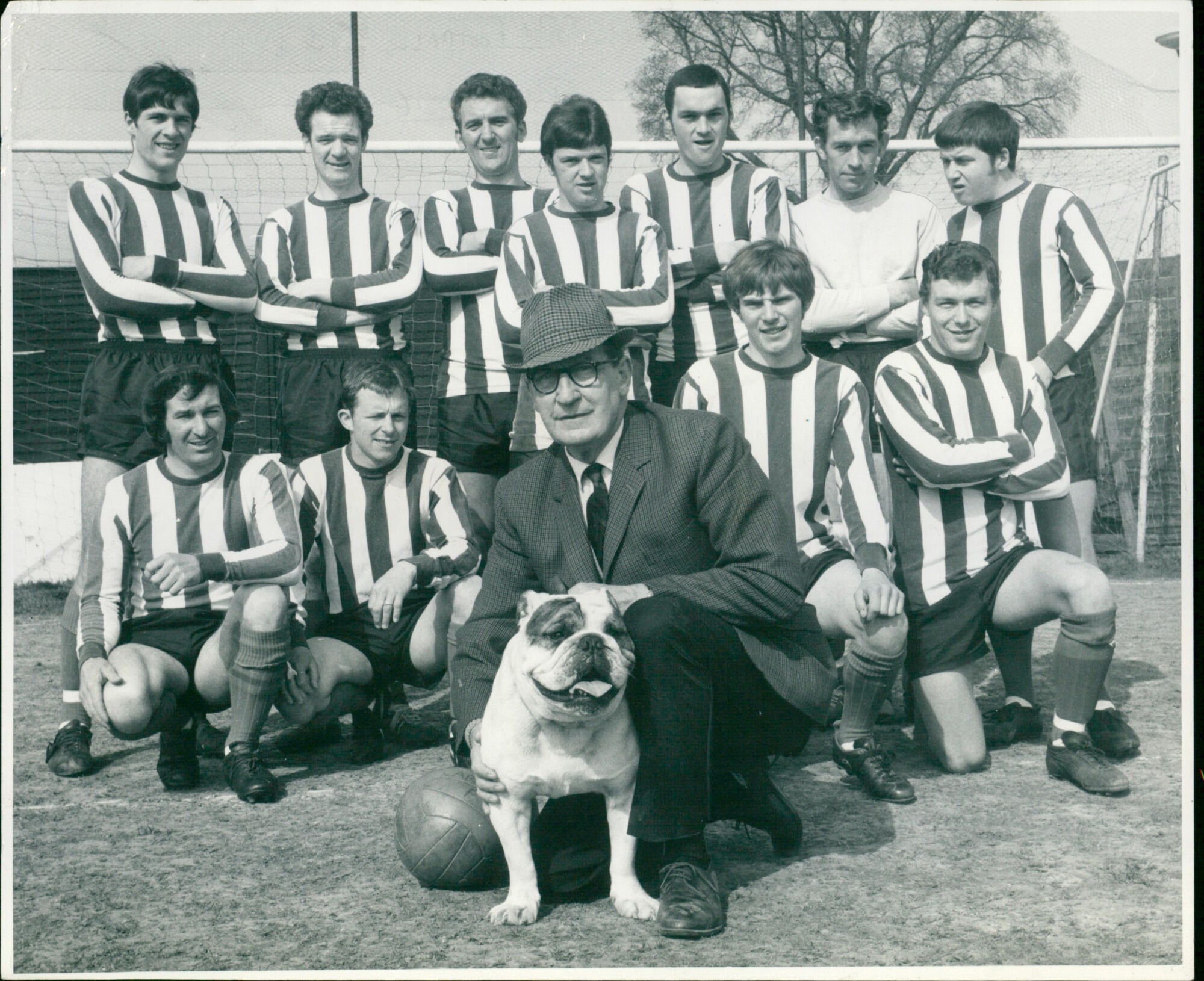 Members of Carterton Football Club pose with their 1969 mascot Growler
