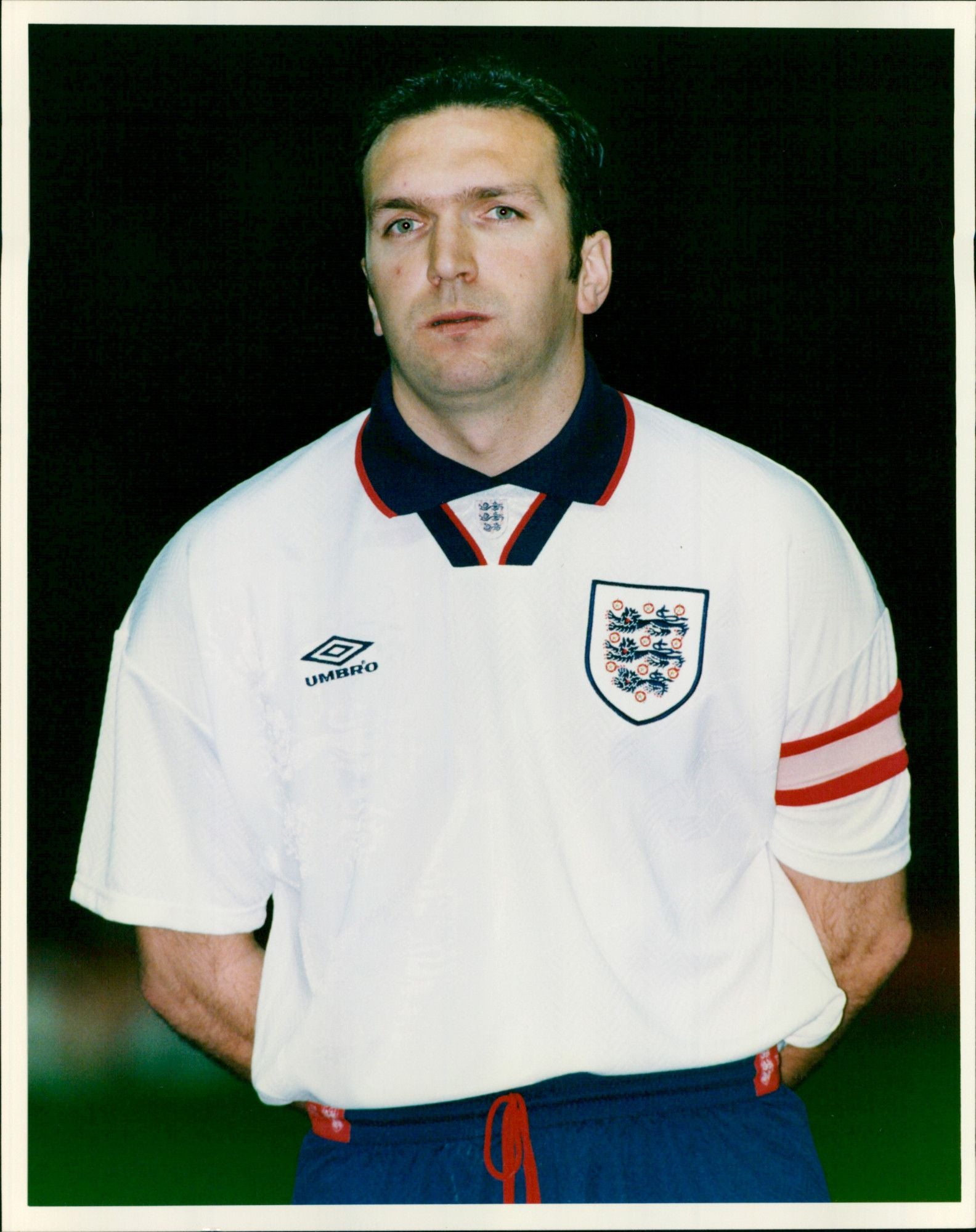 Former England footballer Neil Ruddock poses with an UMBRO 99 football