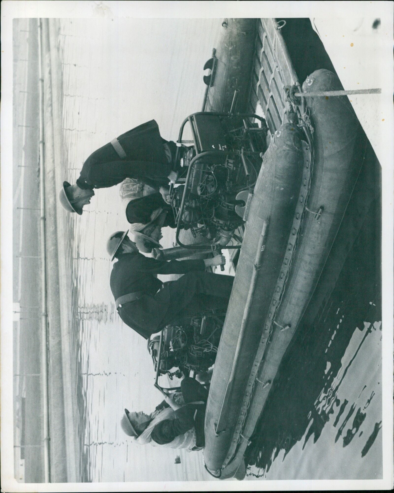 Firefighters conducting a drill with a water jet propelled craft. - Vi