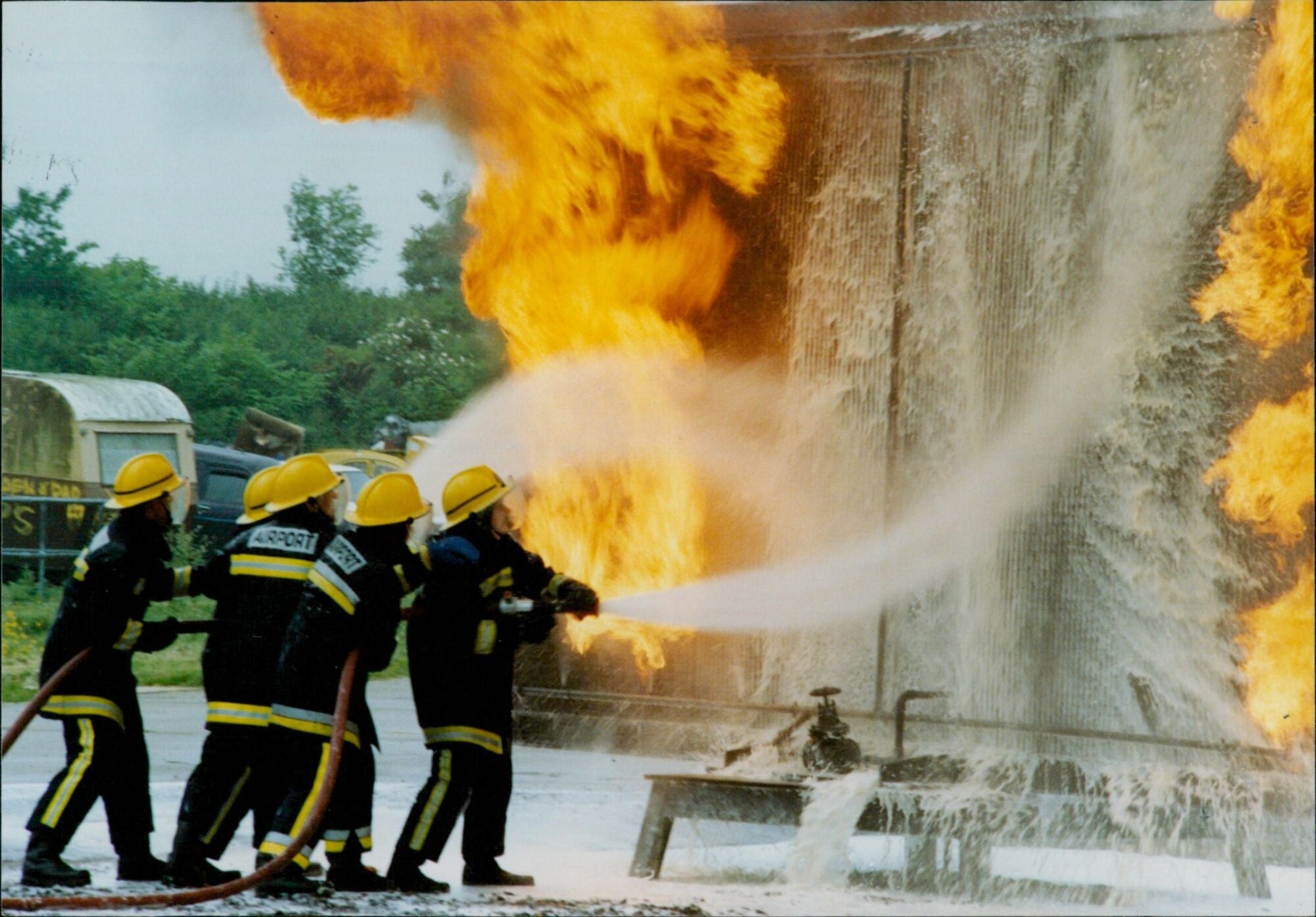 Firefighters from British Airports testing Angus Fire Armour foam on a