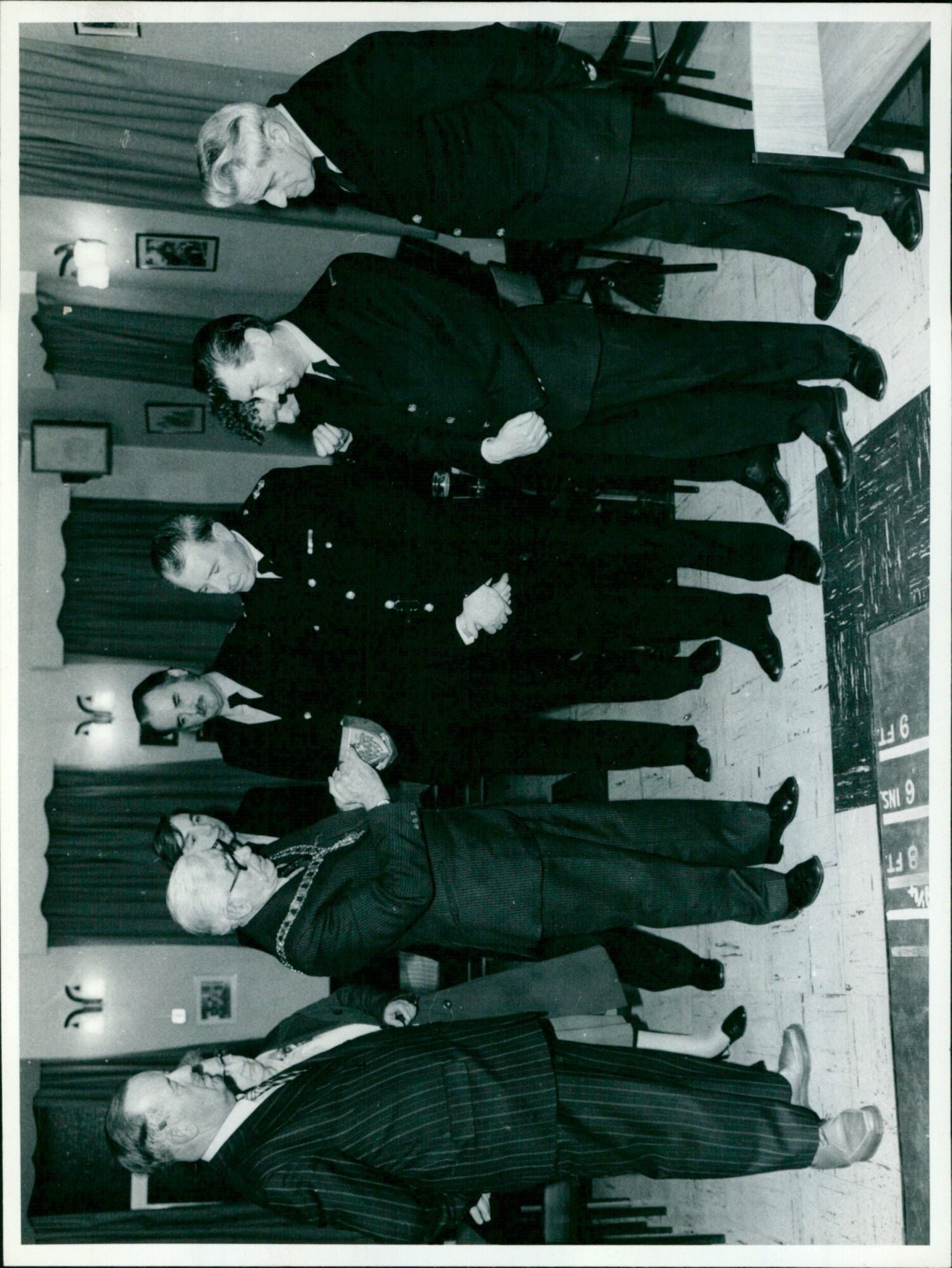 Mayor Joe Bill unveils a plaque commemorating the history of the Bic F