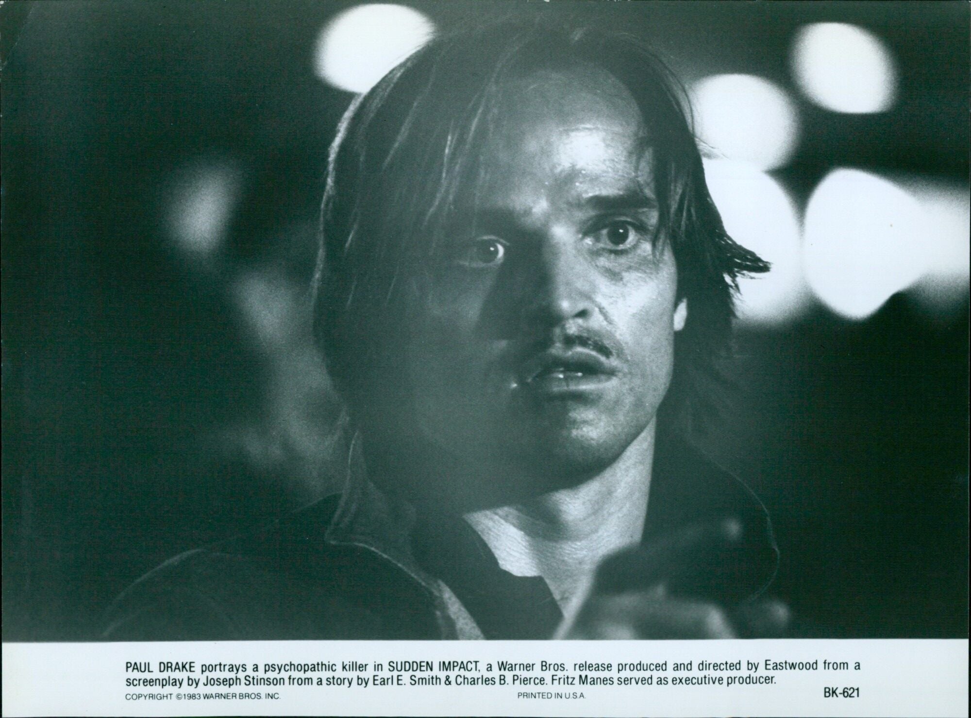 Actor Paul Drake in a scene from the 1983 film Sudden Impact. - Vintag