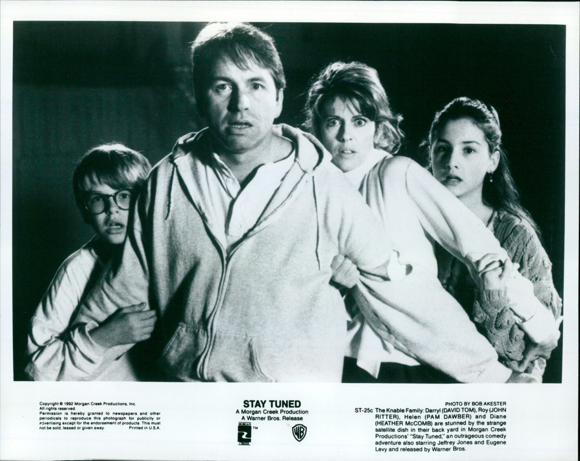 The Knable family – Darryl, Roy, Helen, and Diane – are surprised by a