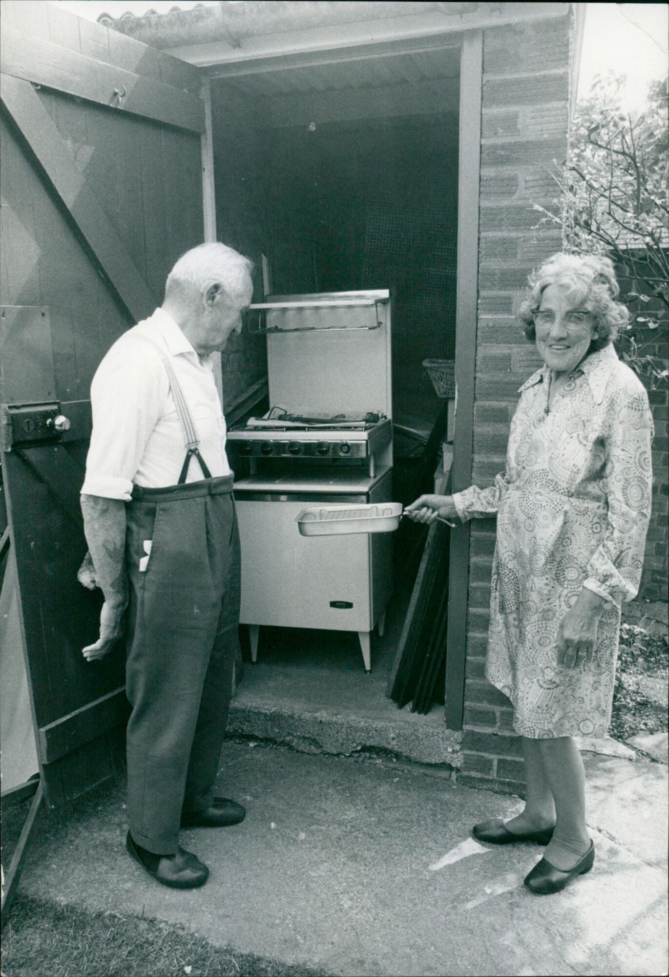Mr and Mrs Dennings with their repaired gas cooker. - Vintage Photogra