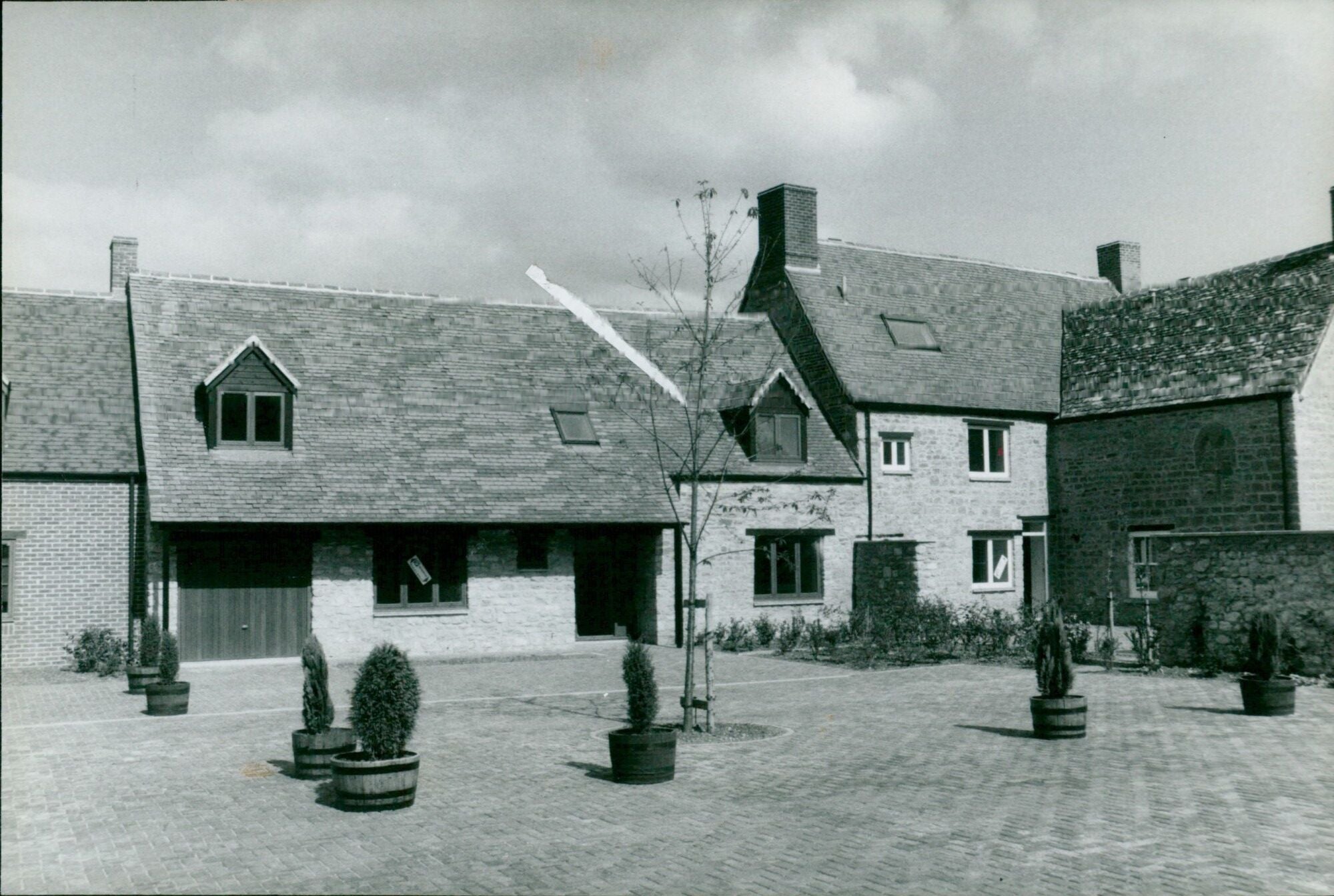 Former Dean Court Farmhouse and its surrounding homes in Botley, Engla