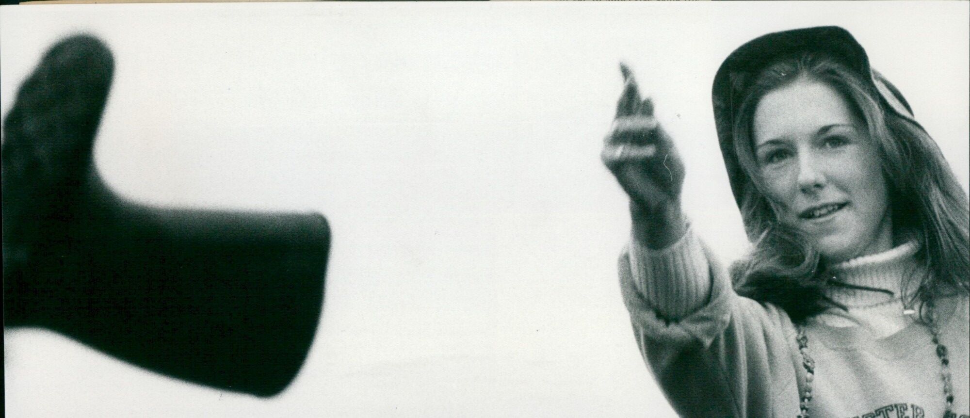 Rosalind Becket competes in a wellie-boot throwing contest at the It's