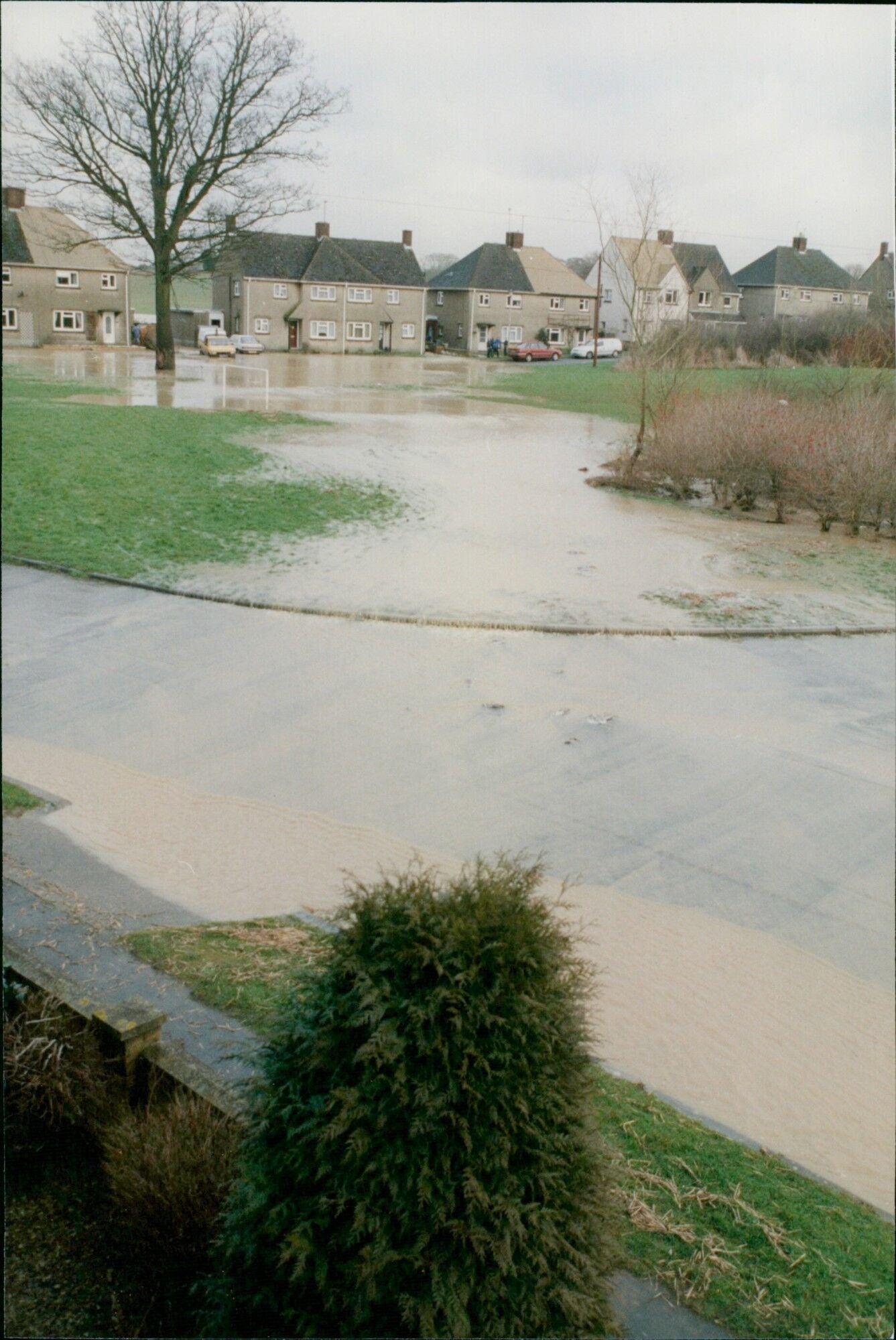 Witney residents battle floods on Hailey Road. - Vintage Photograph