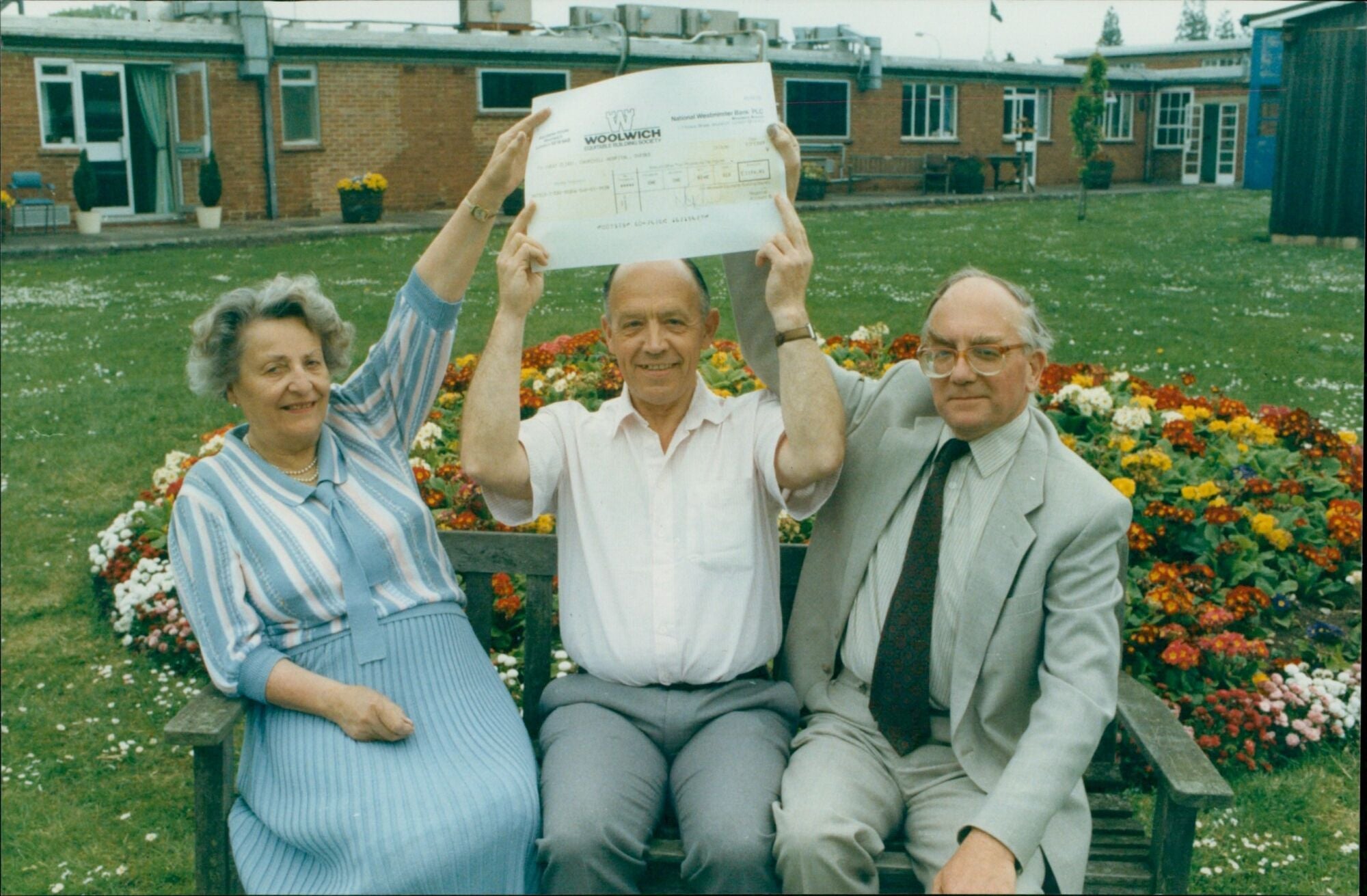 Lady Macclesfield and Donald Lane accept a cheque for the Osler Chest