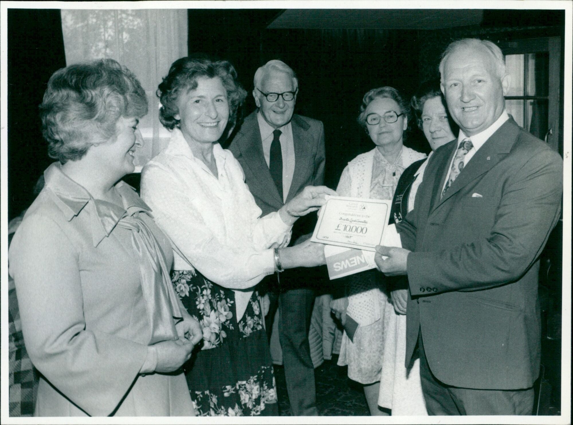 Mrs Lorna England and her committee of the Bicester branch of the Canc