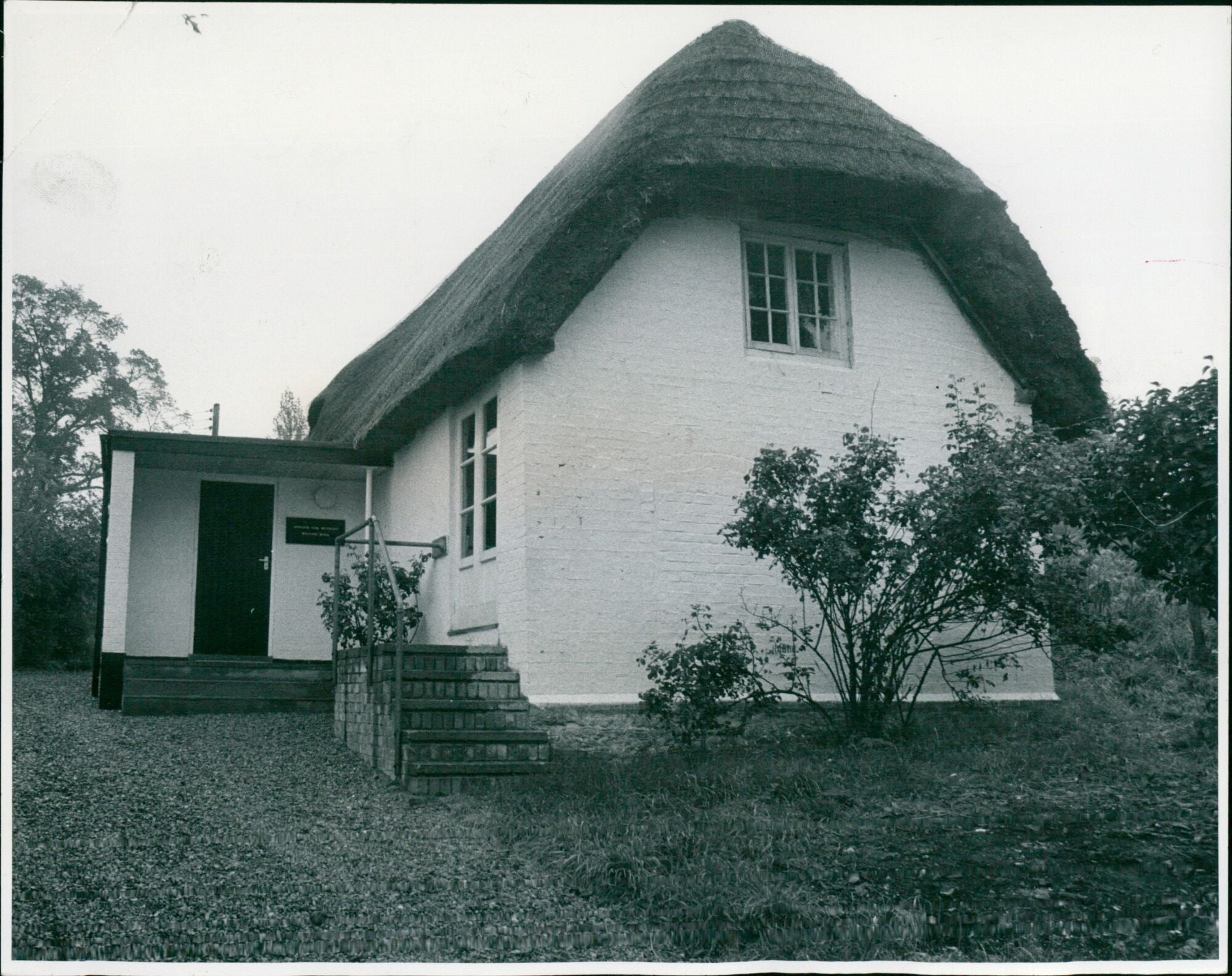 Members of the Horton-Cum-Studley Village Hall erect a paper exposure