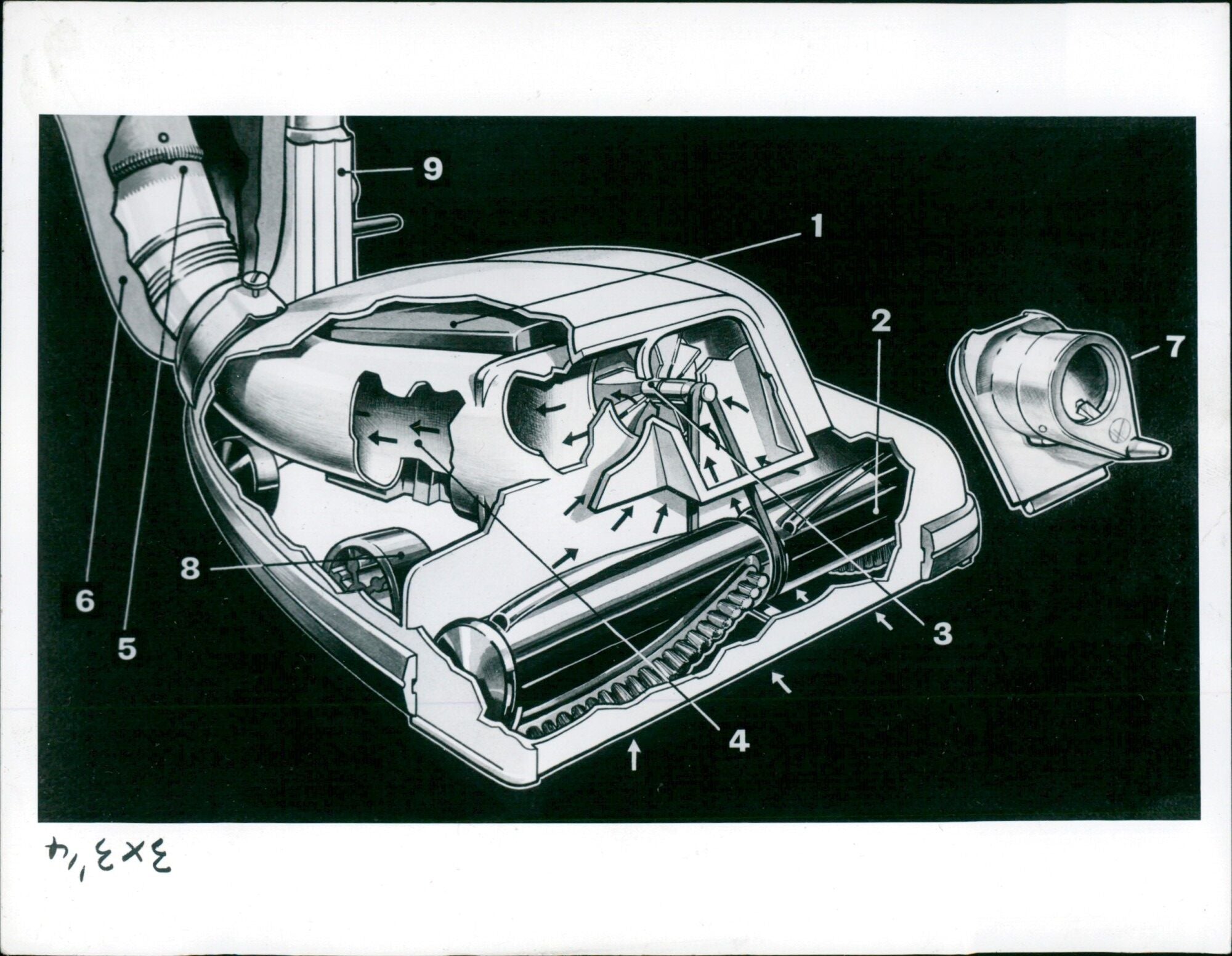 A Hoover Junior vacuum cleaner demonstrating how it works. - Vintage P