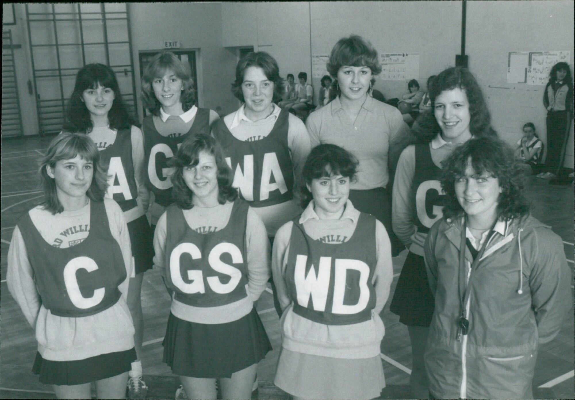 Lord Williams's School girls pose after netball tournament success.