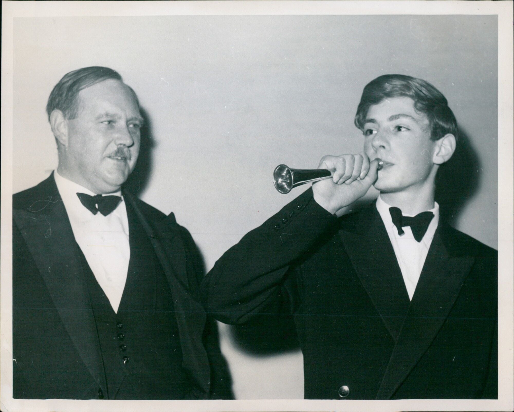 Sir Arundell Neave watching his son Paul in a Hunting Horn Contest.