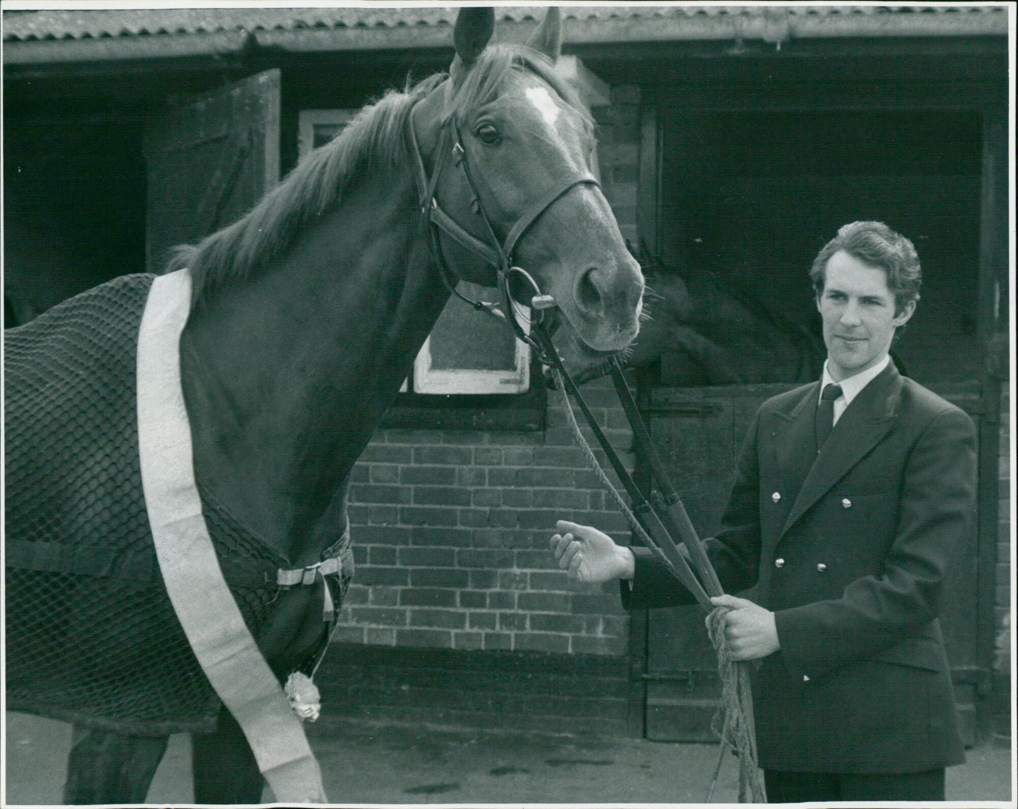 Jockey Graham Thorner poses with his Grand National winner, Well To Do