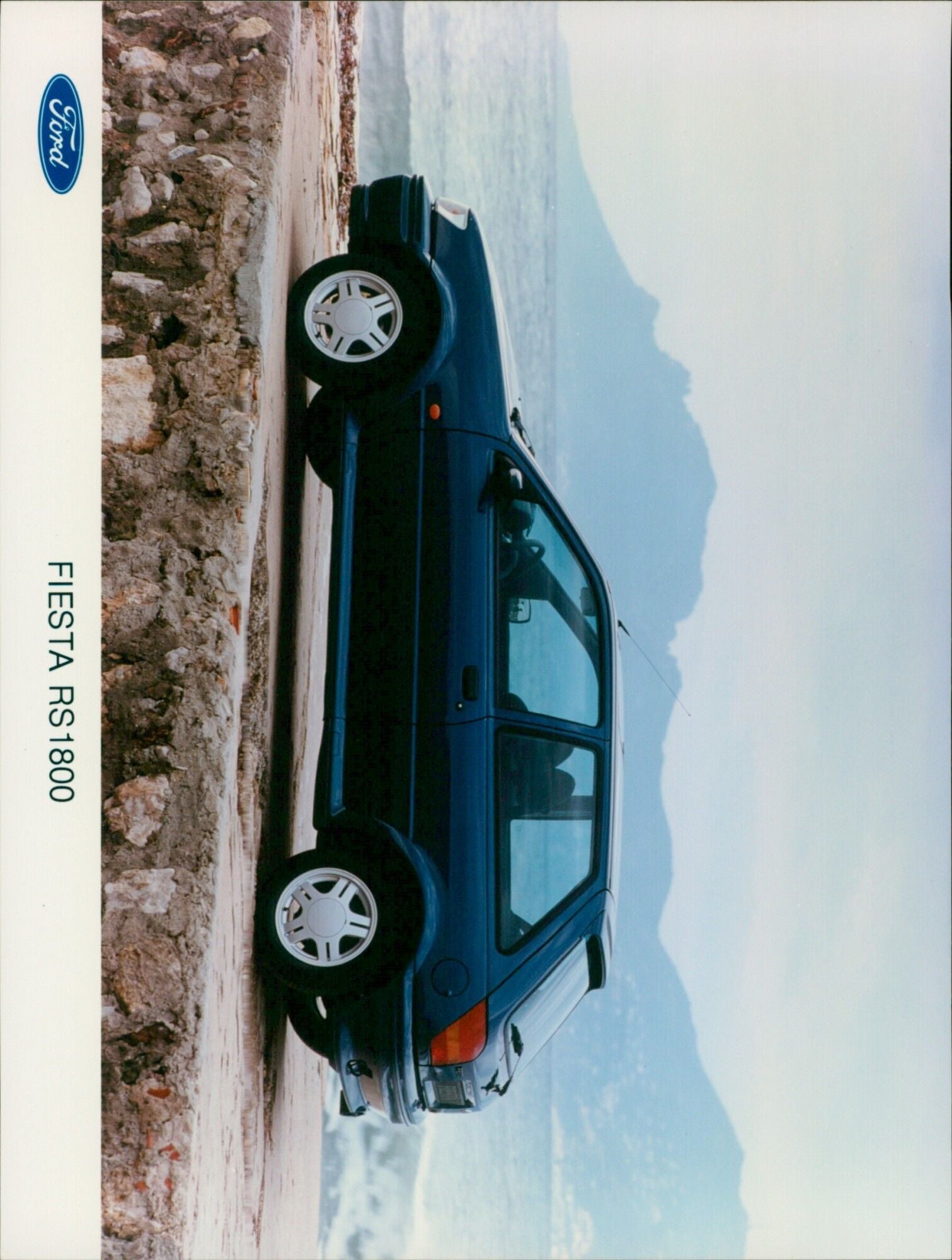 A Ford FIESTA RS1800 on display at a classic car show. - Vintage Photo