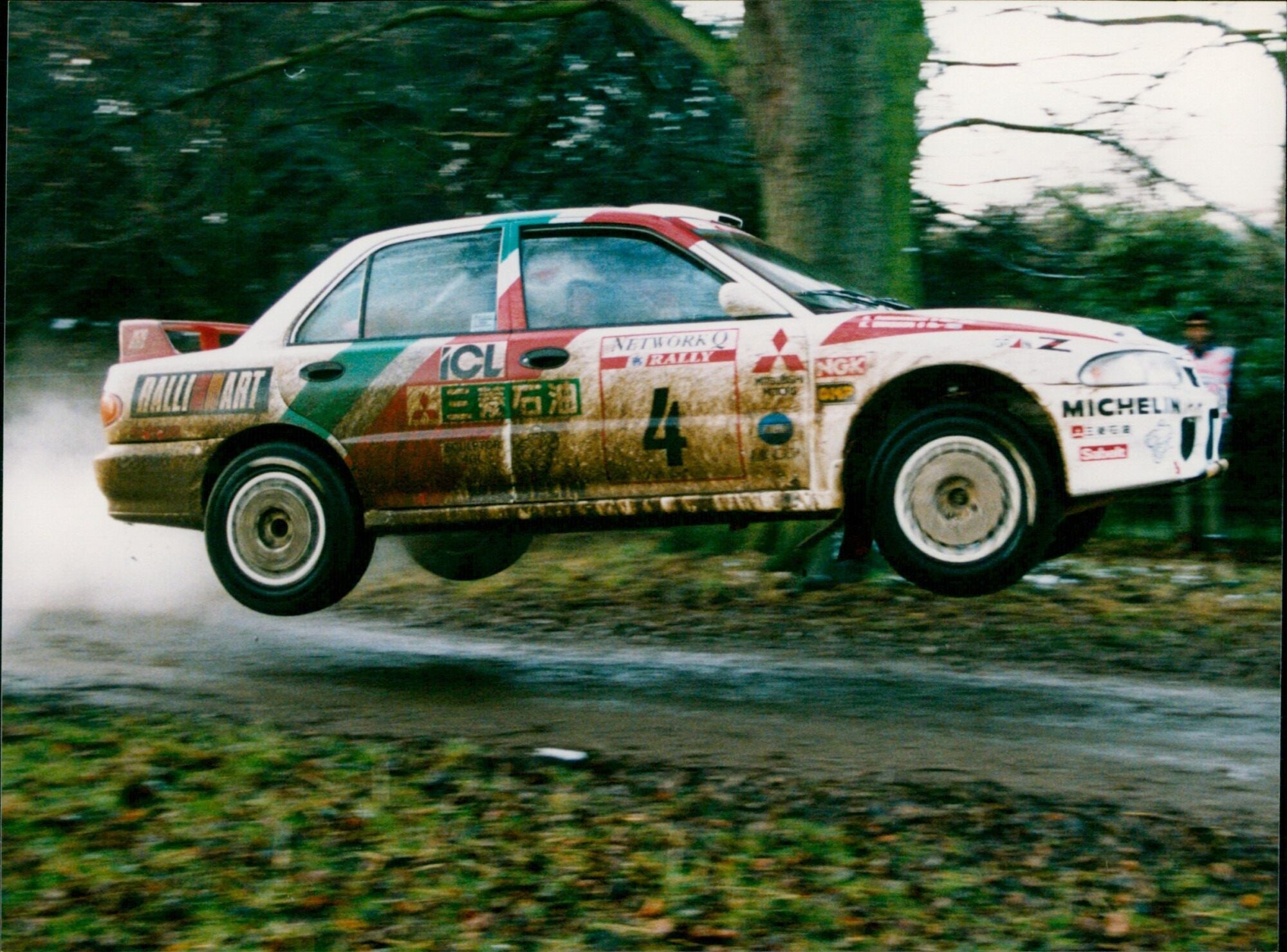Kenneth Eriksson driving a Mitsubishi Lancer Evolution at the 1993 Net