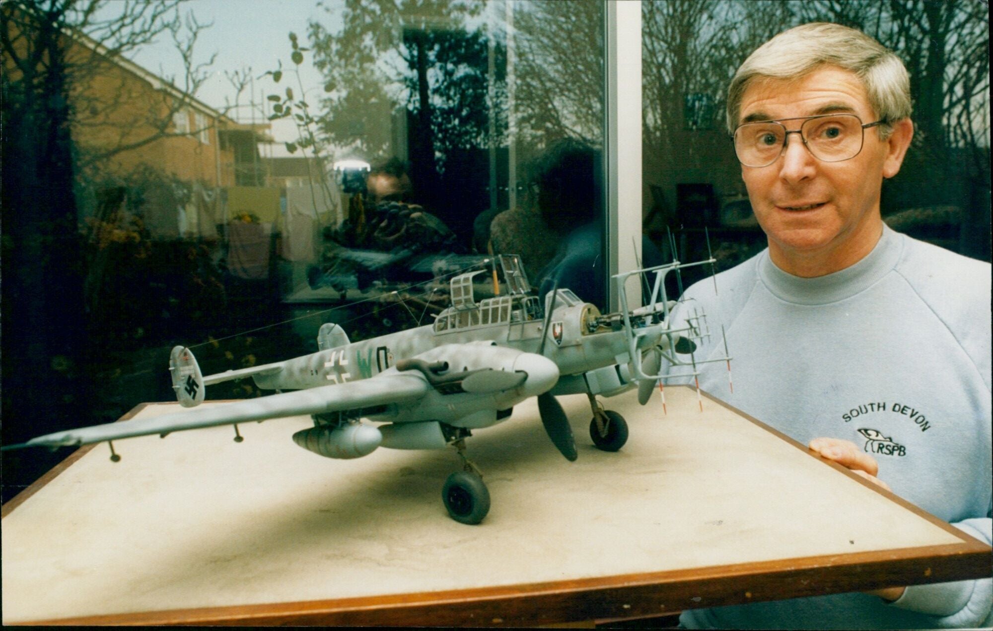 Tony Clements from Abingdon poses with a Messerschmitt plane model.