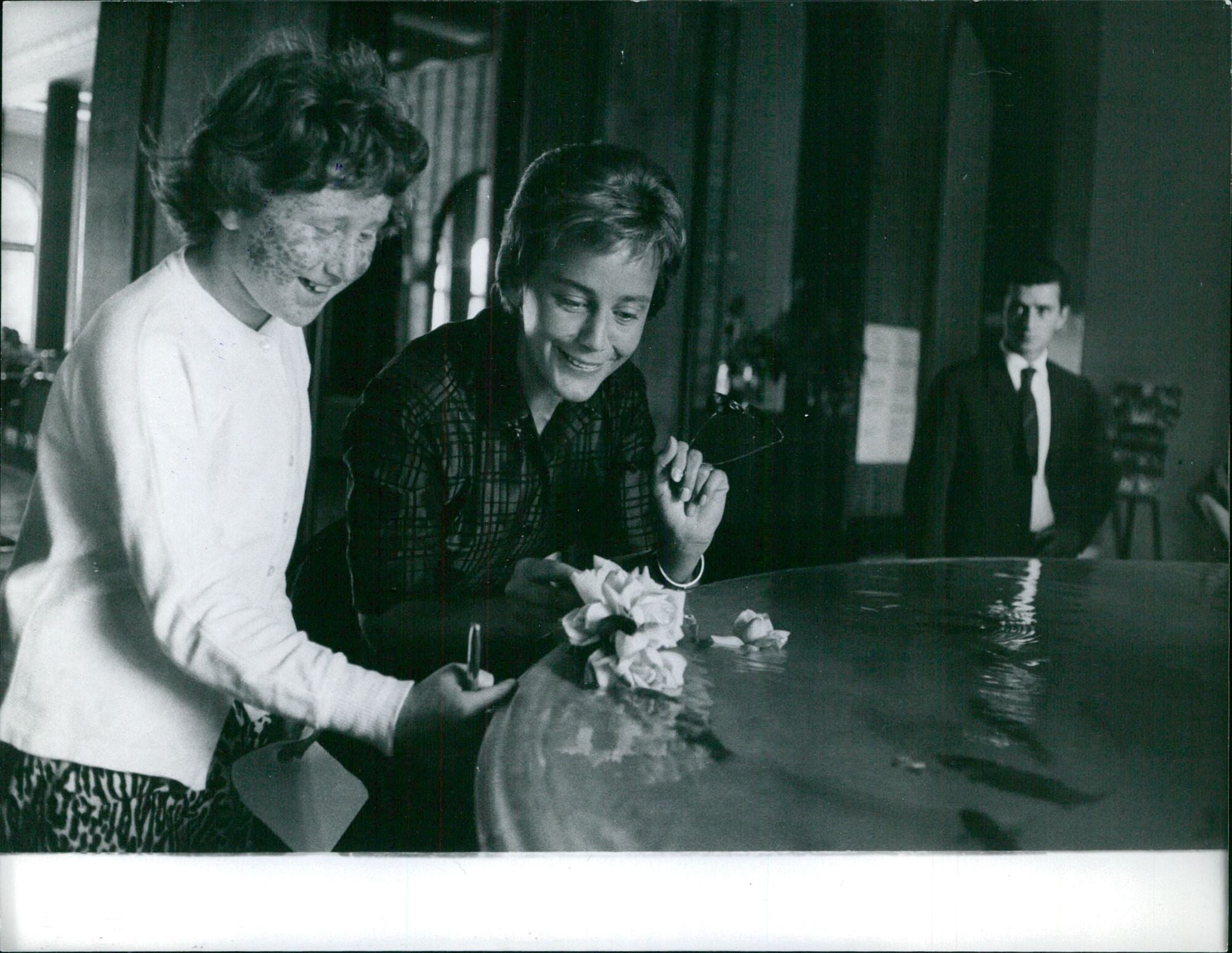Maria Schell poses in front of her painting in Paris, France. - Vintag