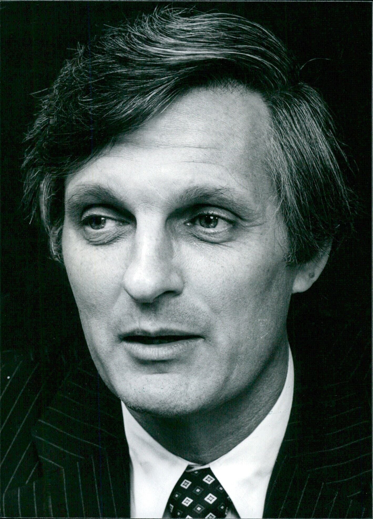 Alan Alda, star of the hit television series "M*A*S*H", poses for a po