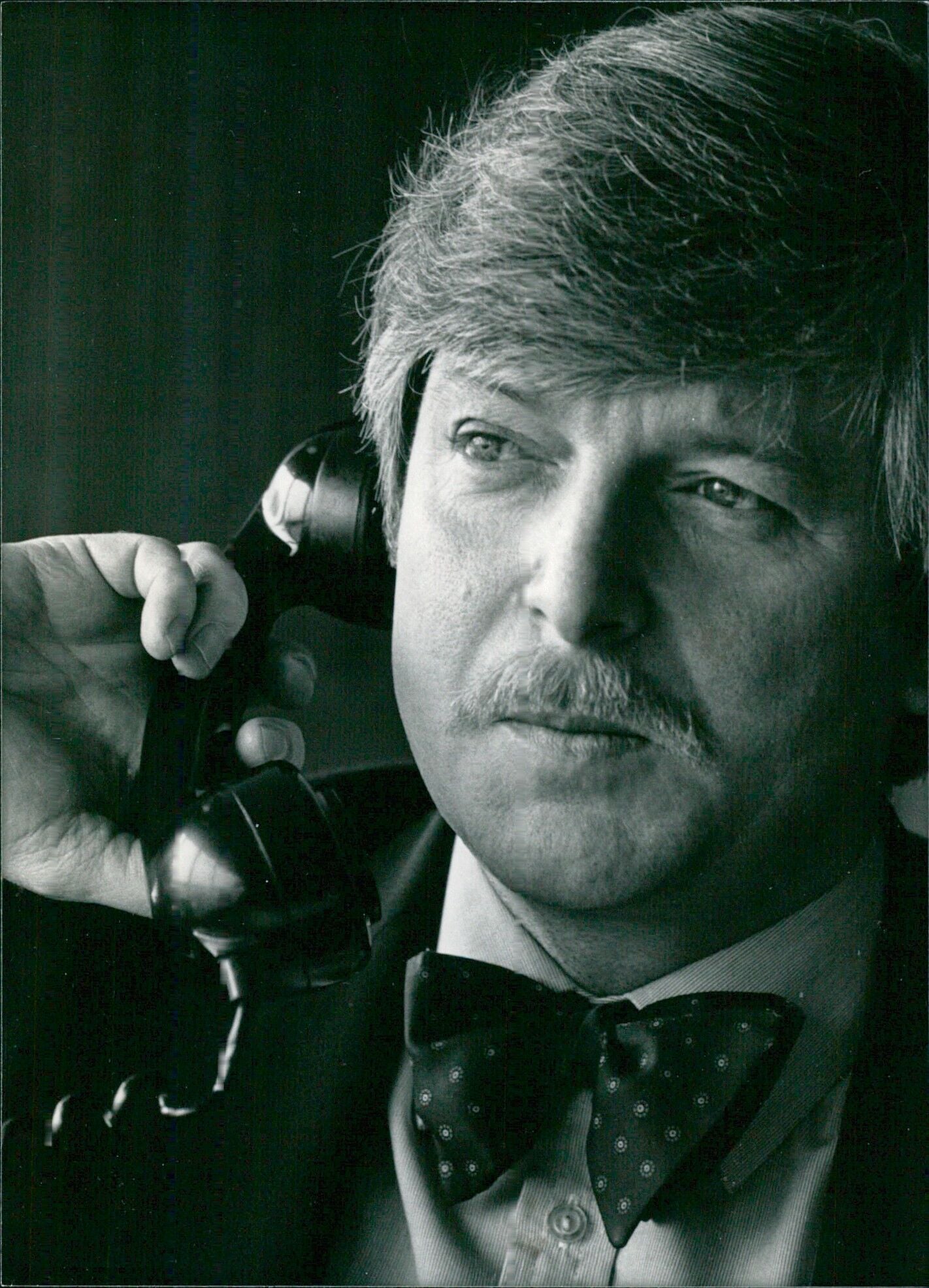 British journalists Mike Molloy (left) and HERBIE KNOTT (right) pose f