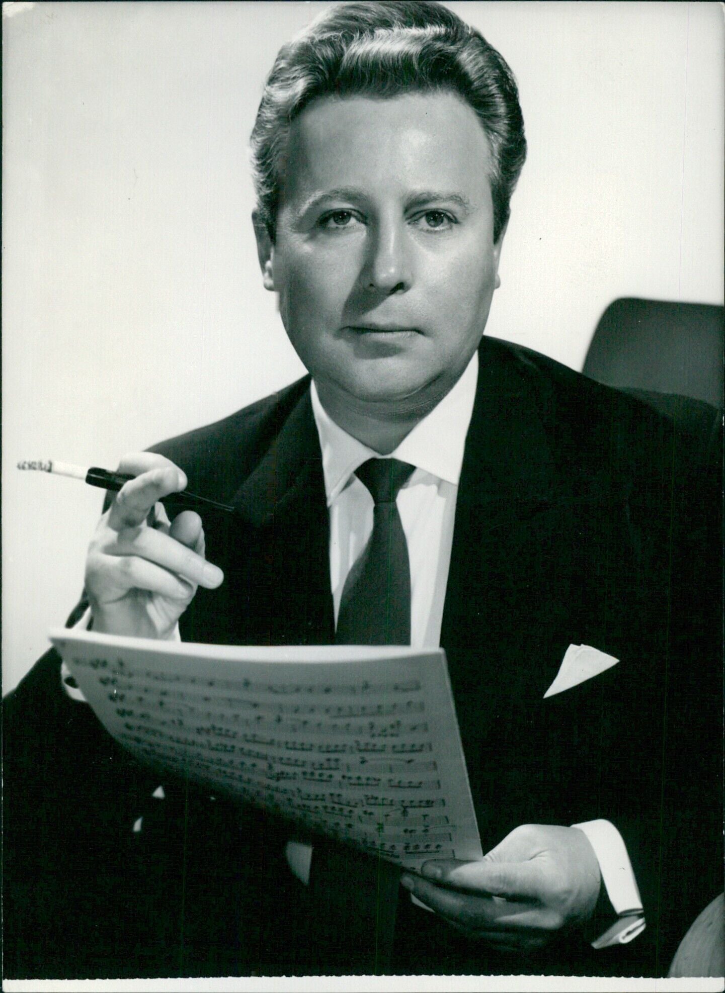 Max Jaffa, a renowned BBC violinist, leads the Palm Court Orchestra in