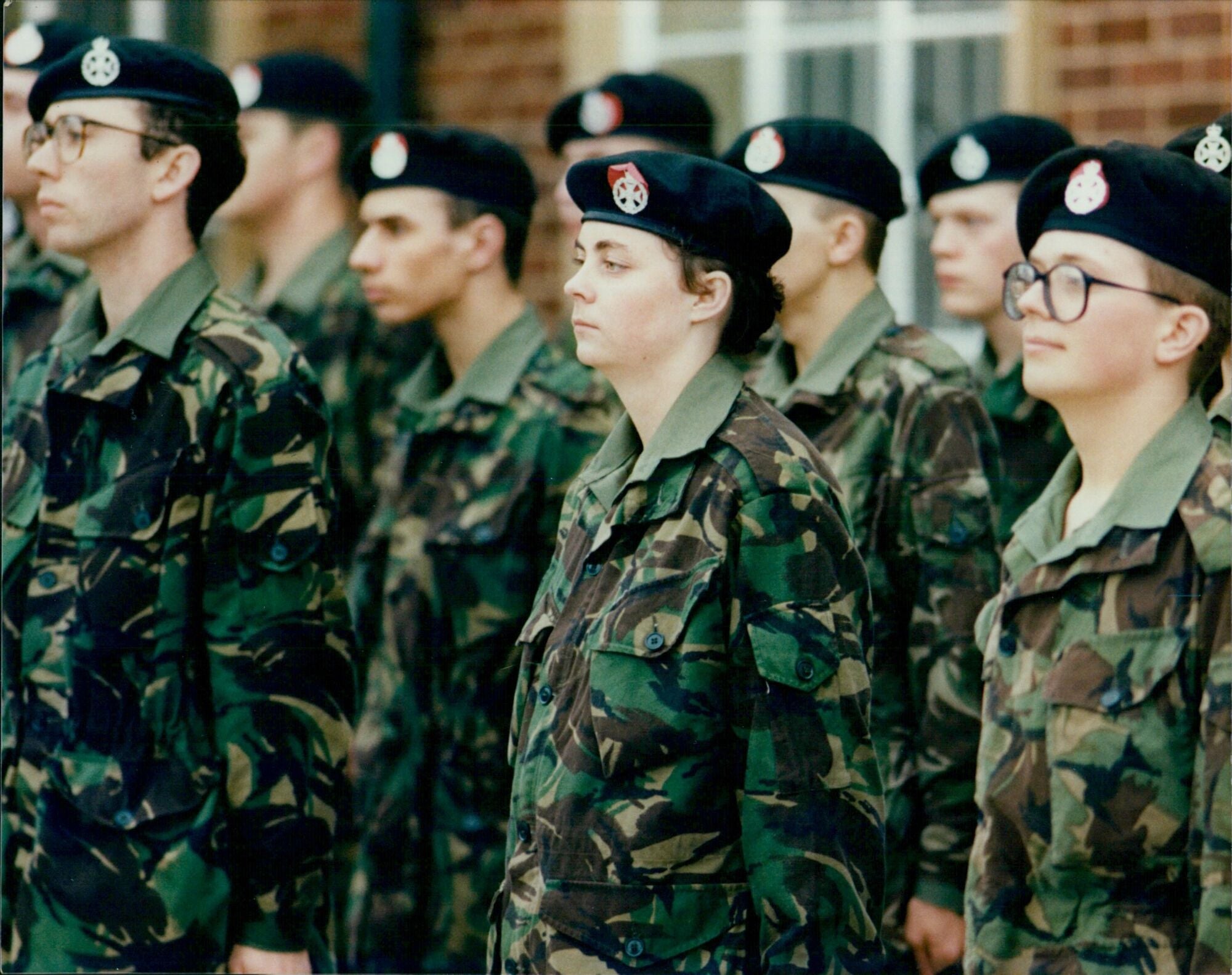 Two female Territorial Army members pose for a photograph at Slade Par